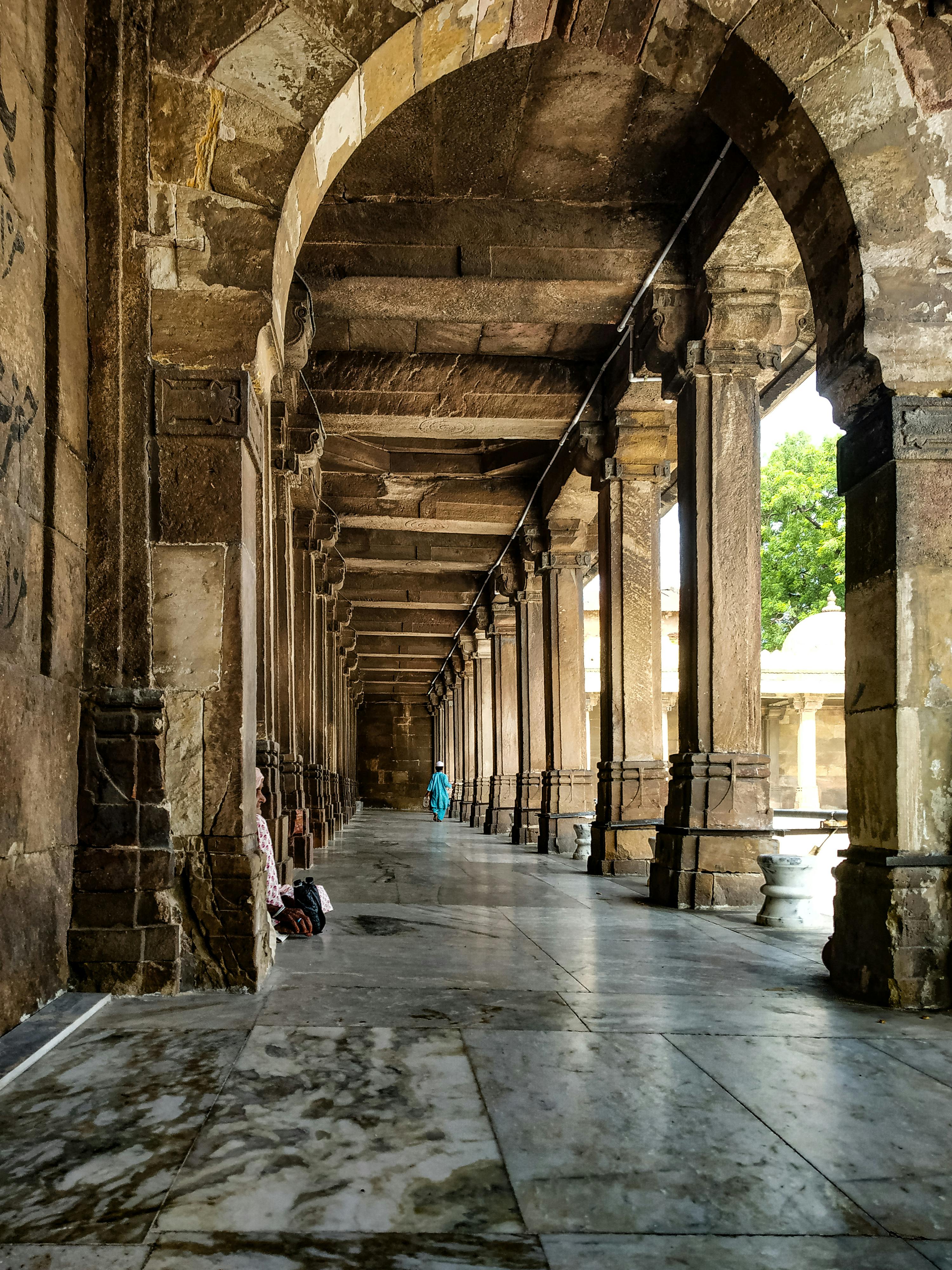 Long Arcade with Arched Columns · Free Stock Photo