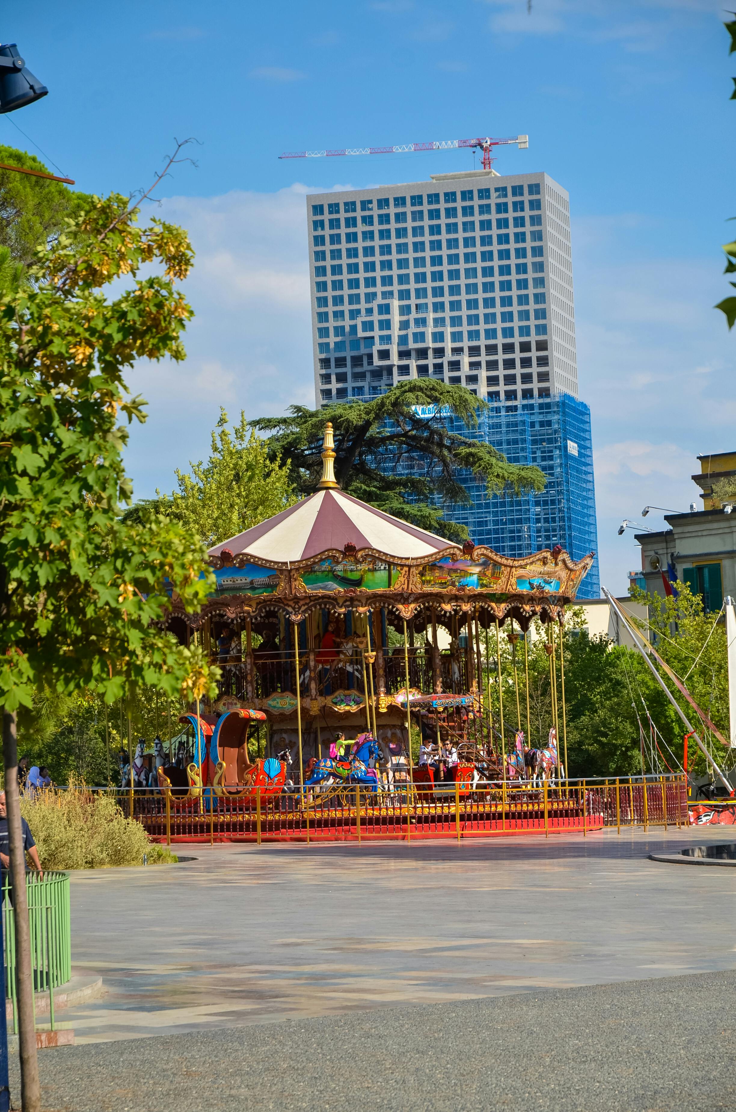 Illuminated carousel in amusement park · Free Stock Photo