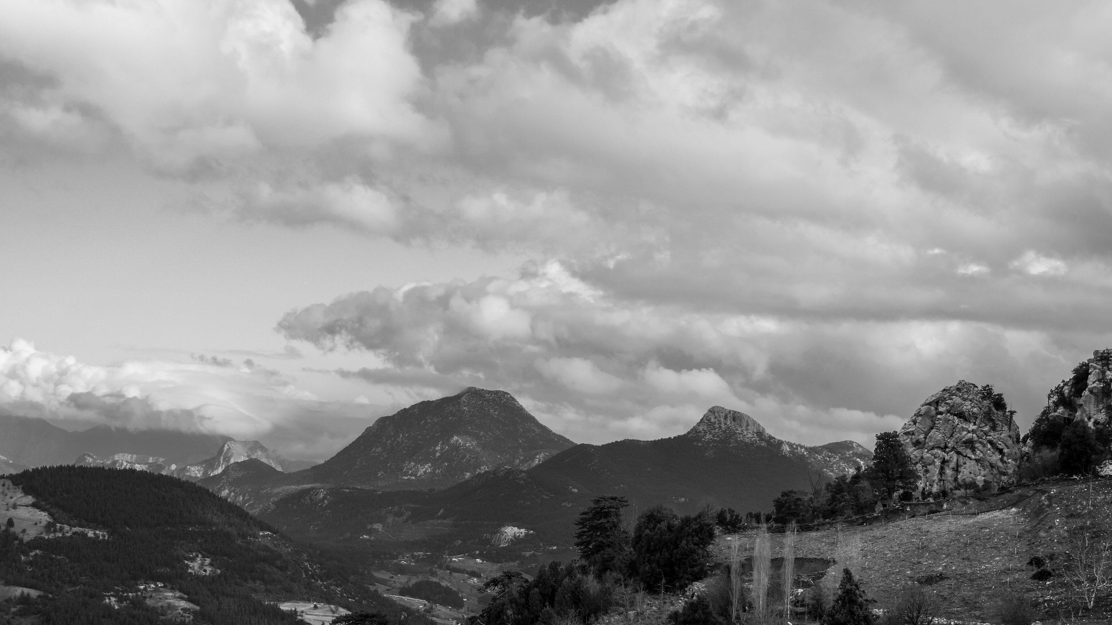 Grayscale Photo of Mountain Range · Free Stock Photo