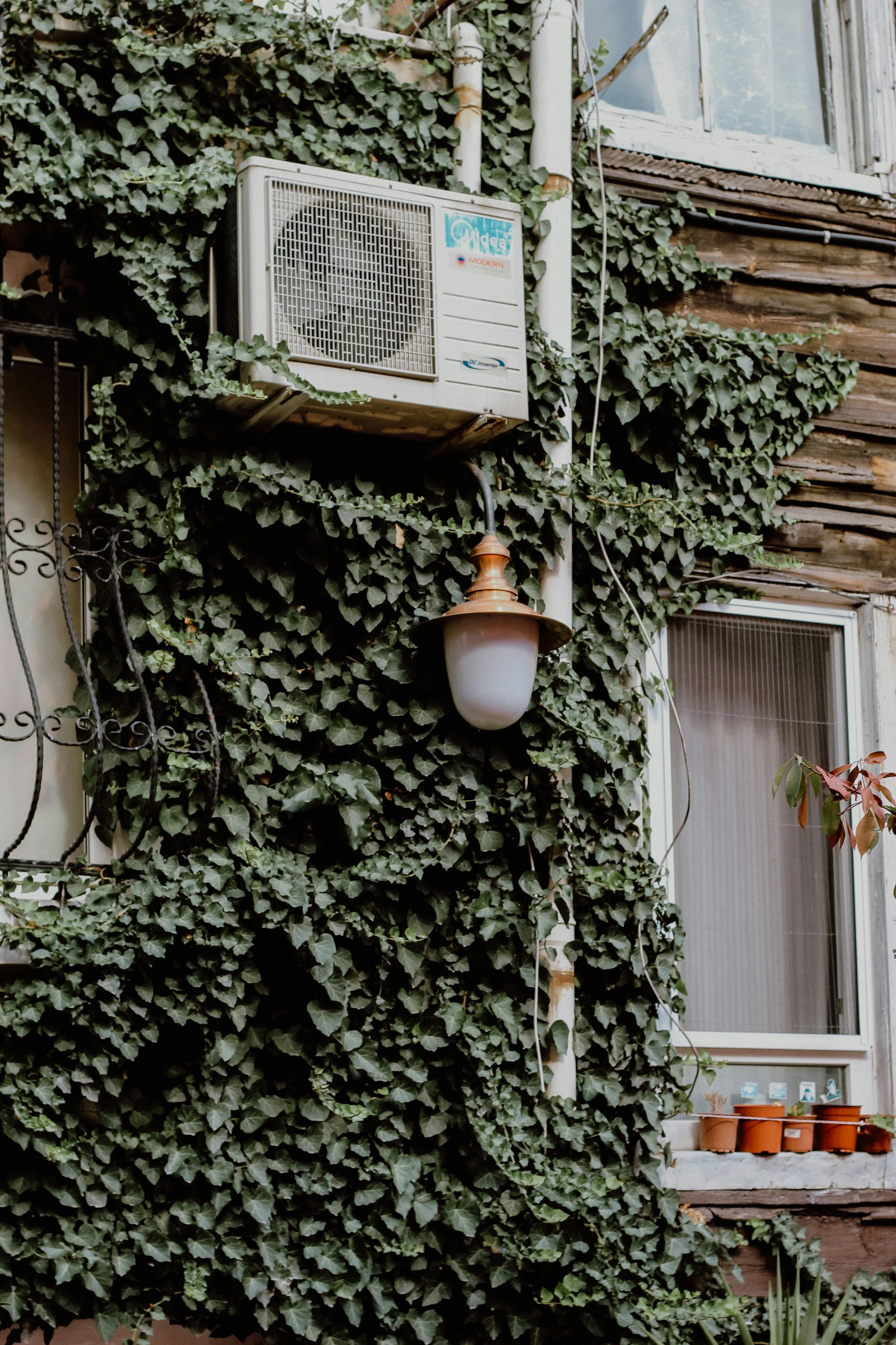 Air Conditioner in Front of Apartment · Free Stock Photo