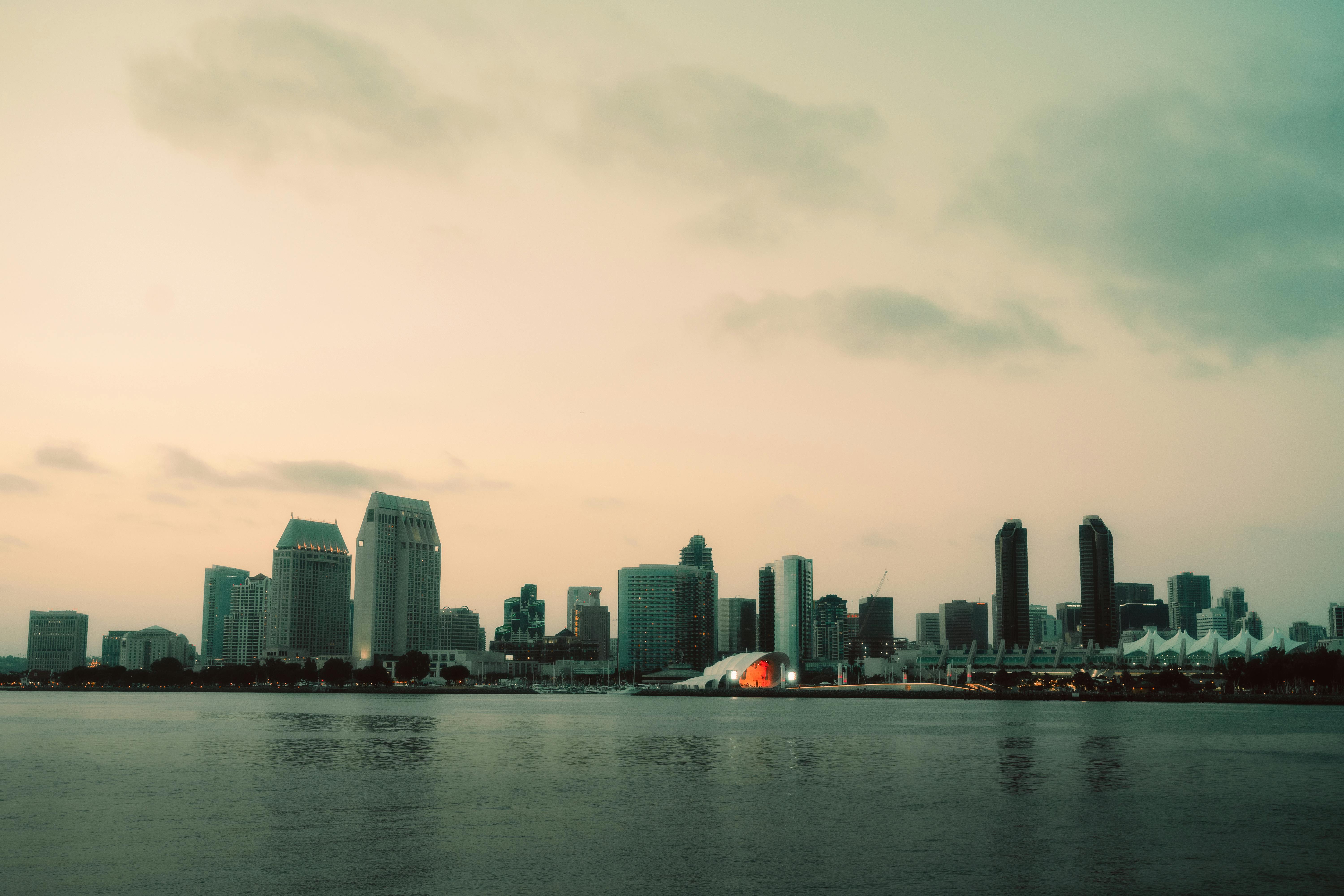 City Skyline across Body of Water · Free Stock Photo