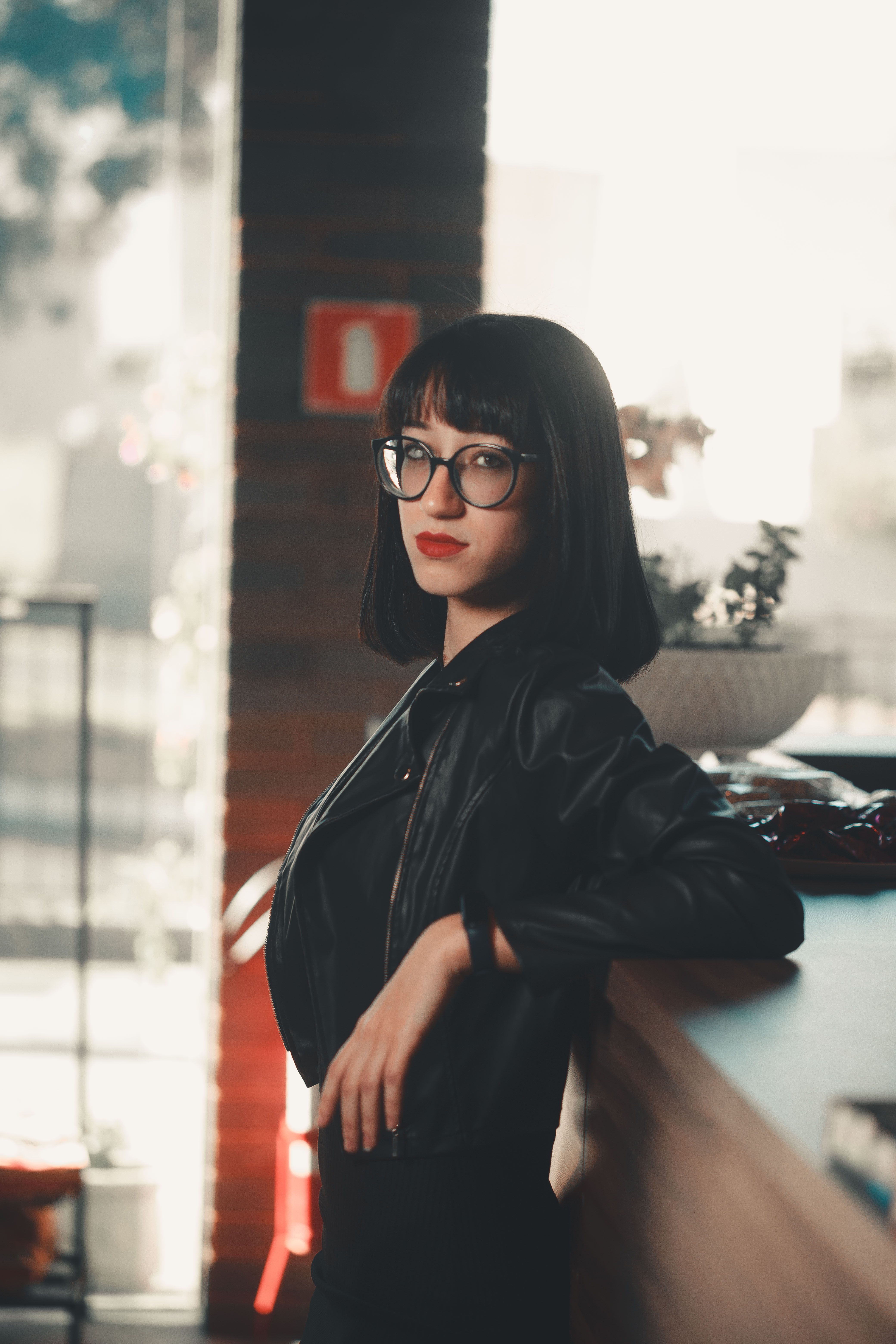 Portrait of Woman Posing in Leather Clothes · Free Stock Photo