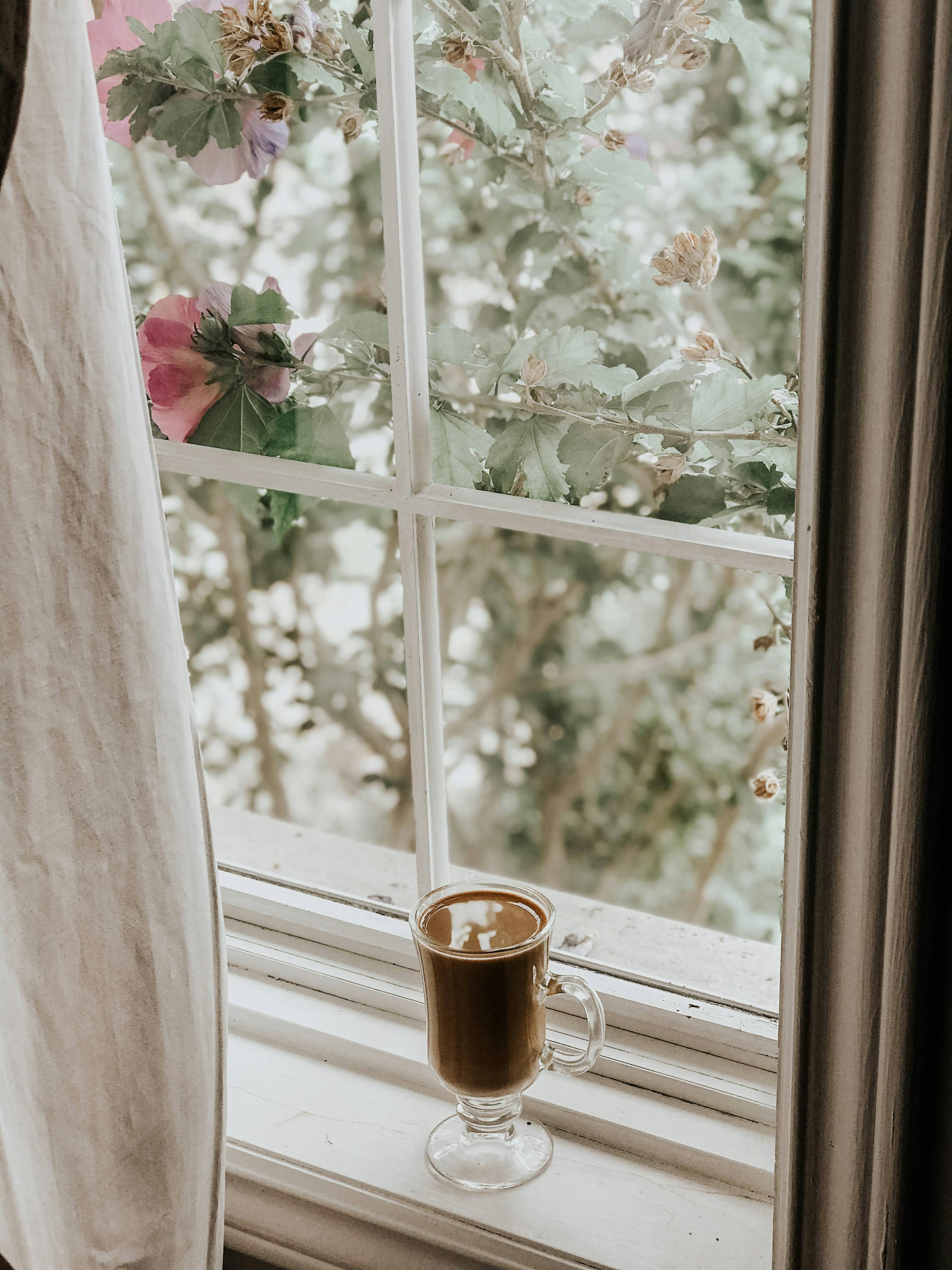 A Coffe on a Window · Free Stock Photo