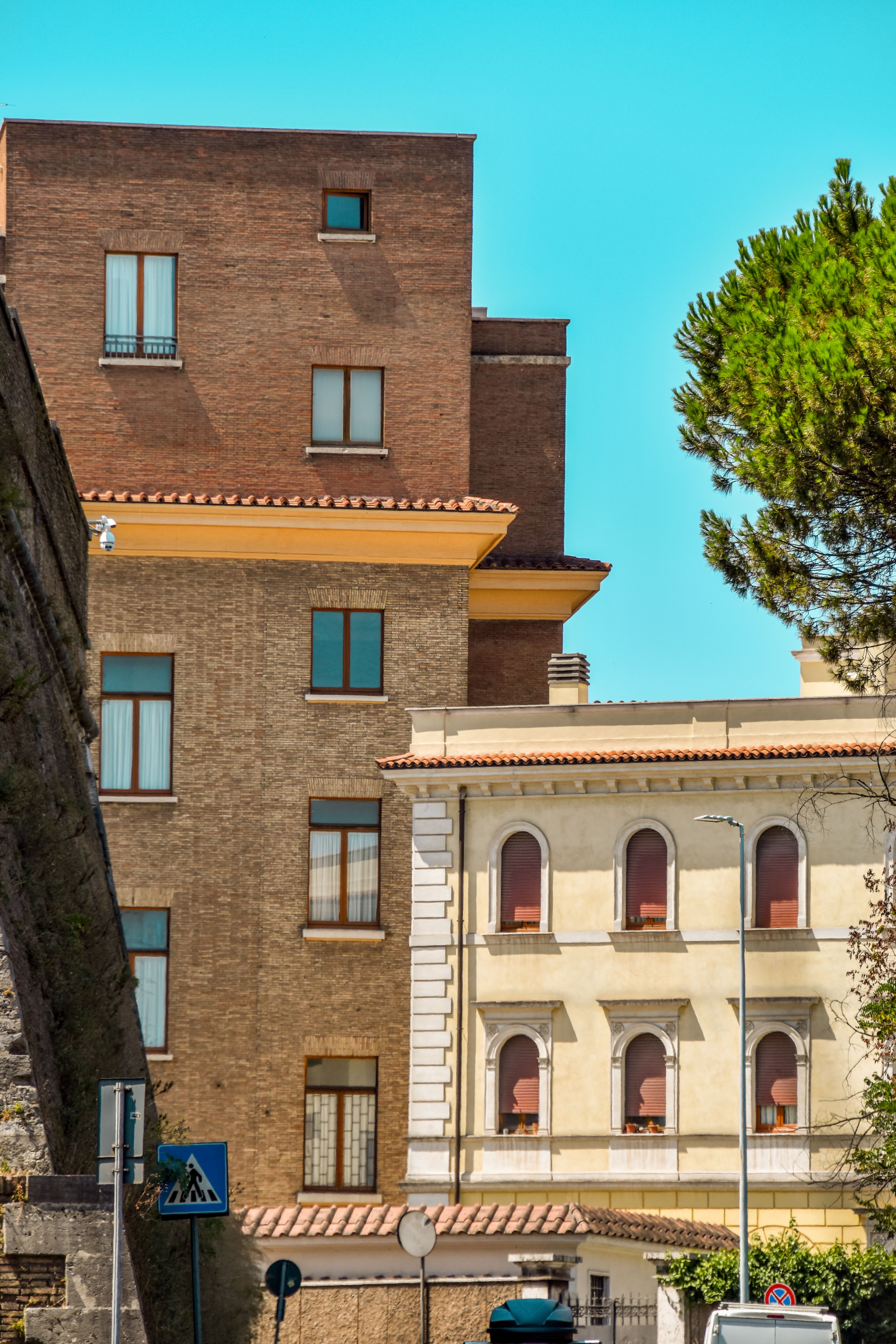 Red Concrete Building Under the Blue Sky · Free Stock Photo