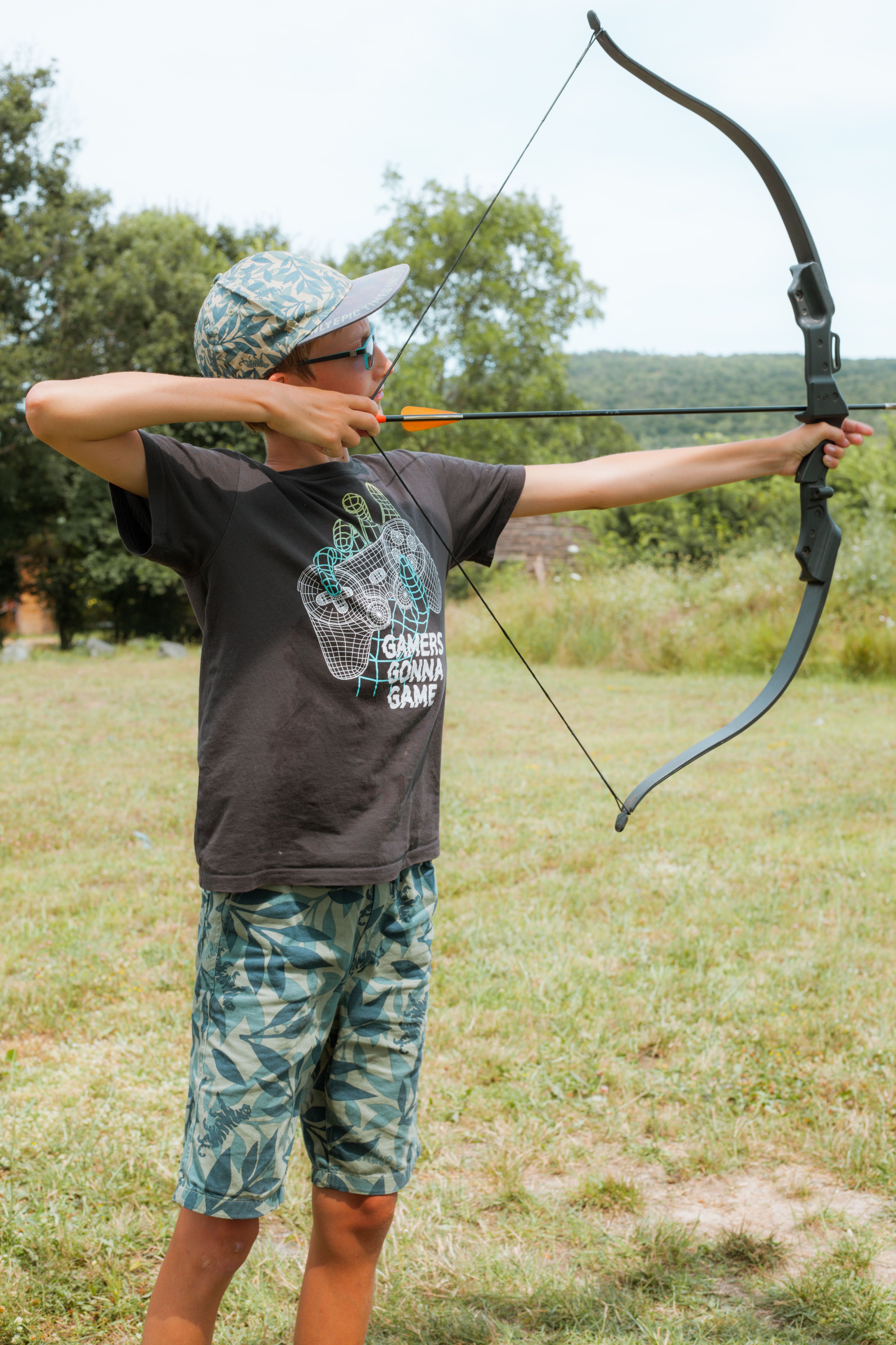 People Shooting with Bows · Free Stock Photo