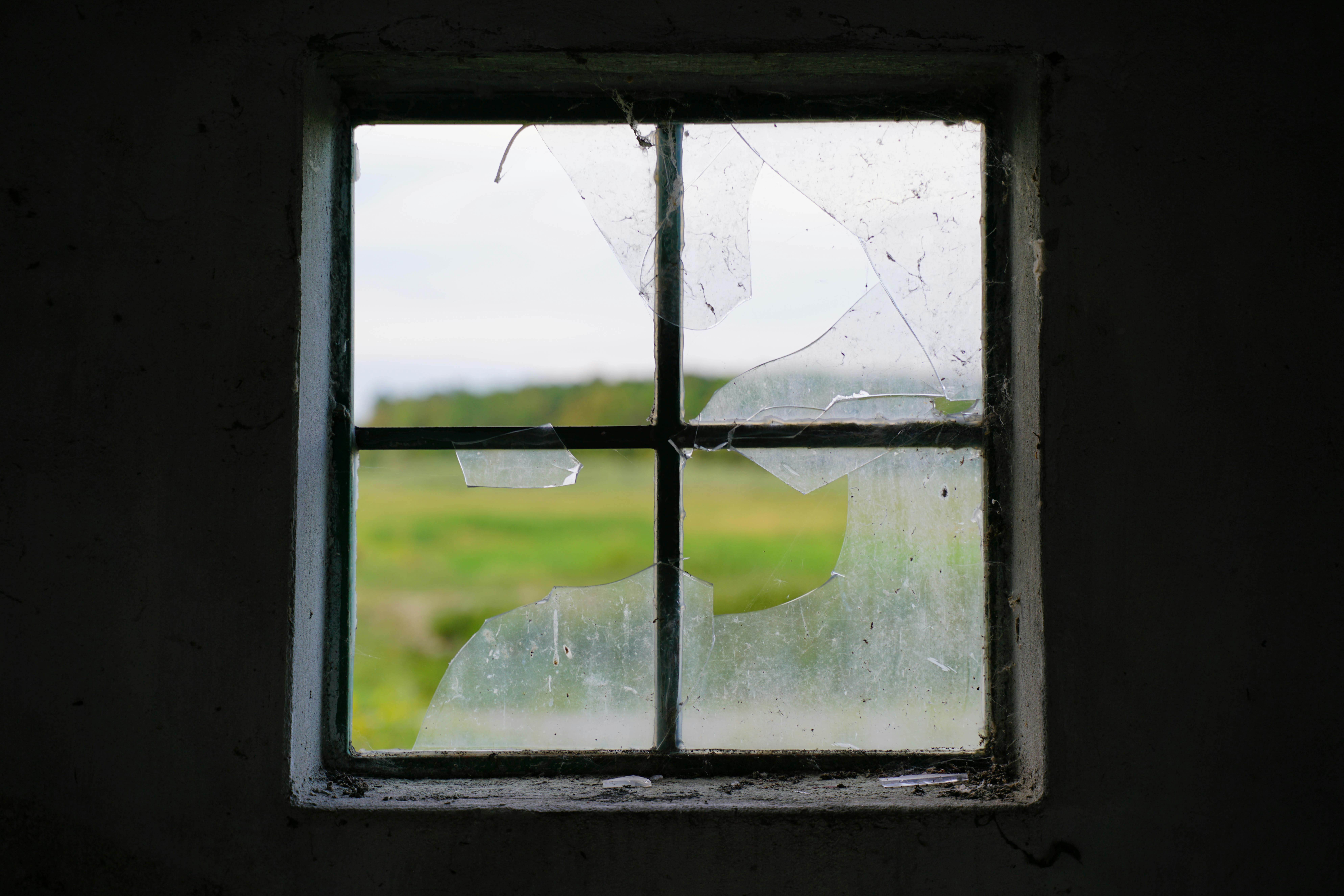 Broken Glass of an Old Window · Free Stock Photo