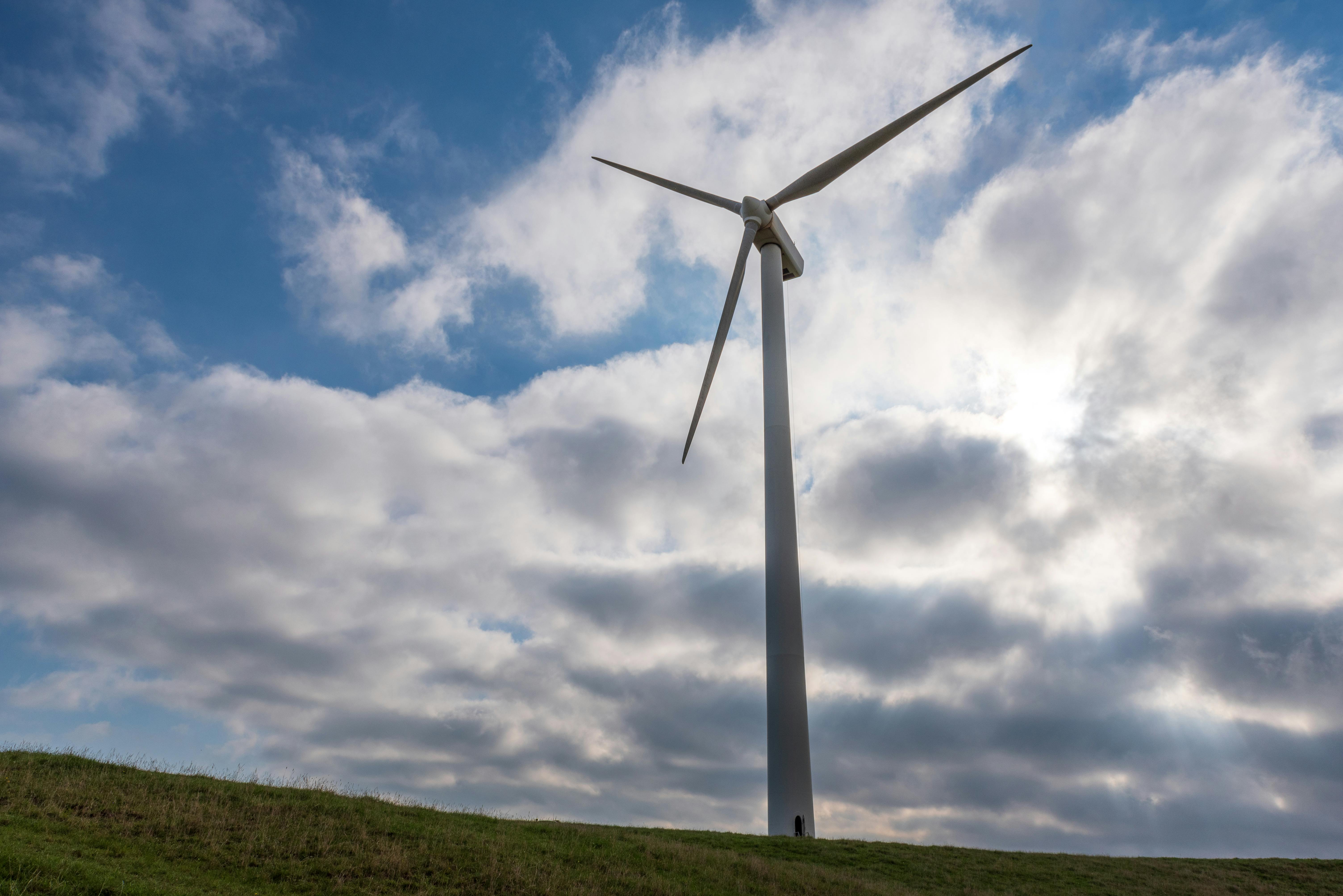 White 3-blade Windmill Under Cloudy Sky · Free Stock Photo