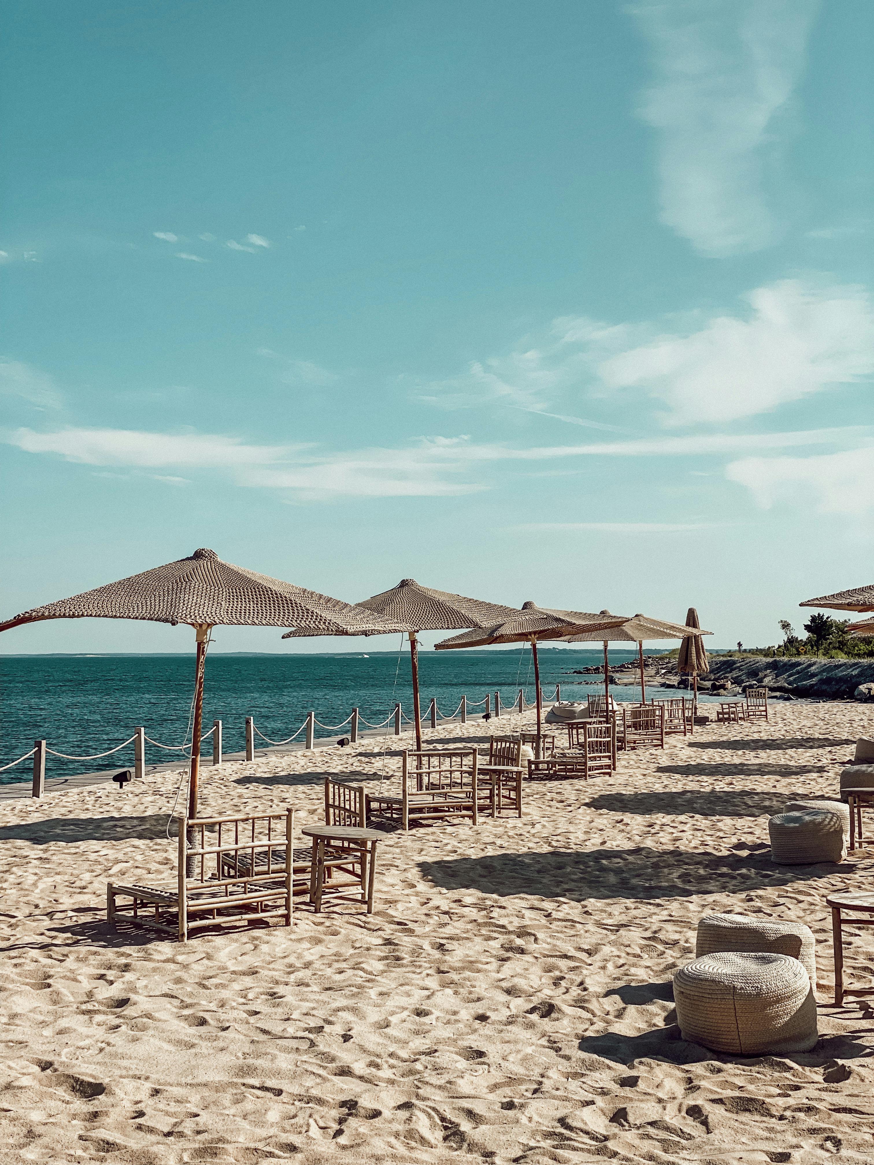 Photo Of People Standing Near Sea · Free Stock Photo