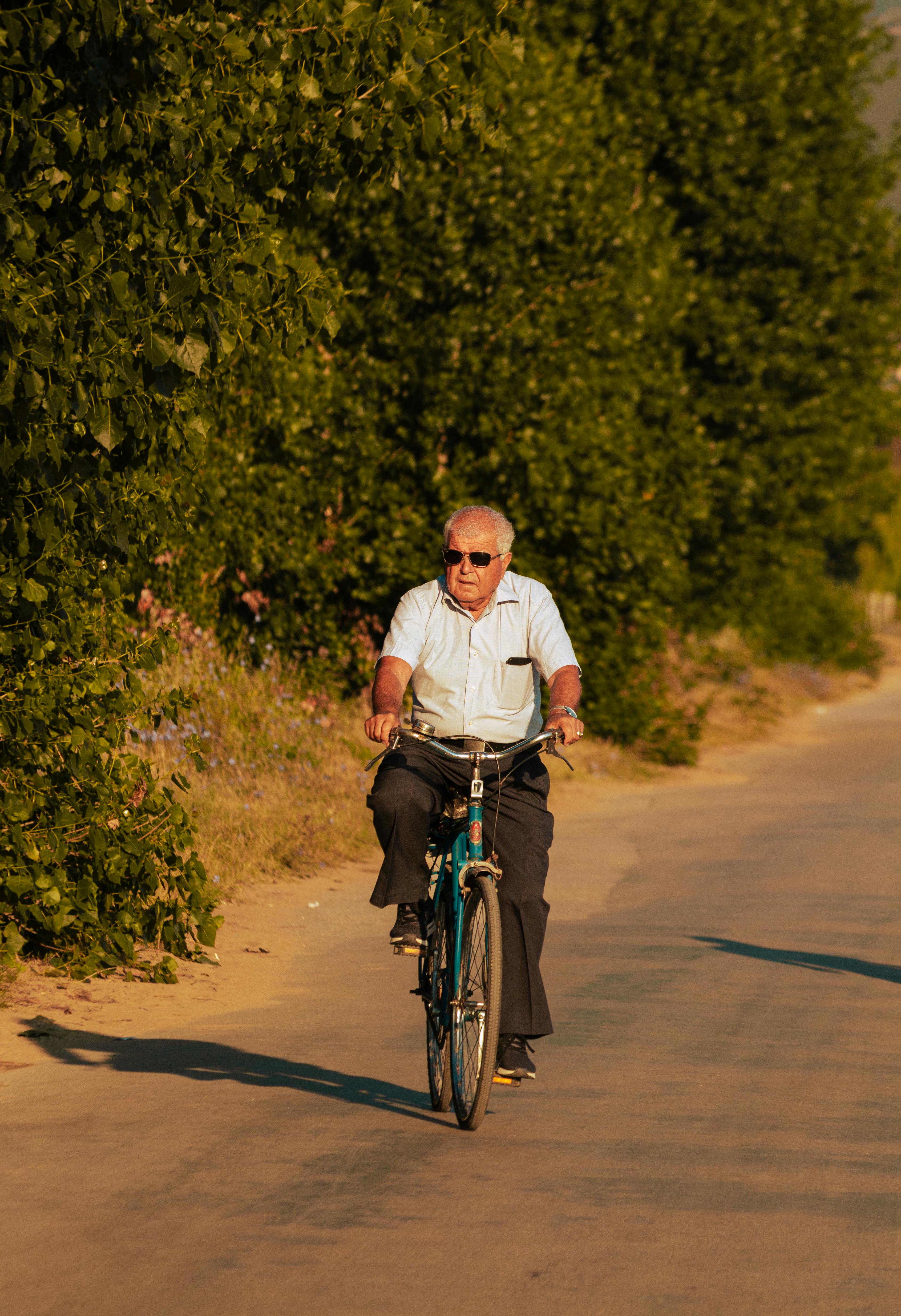 Man Riding a Bike During Sunset · Free Stock Photo
