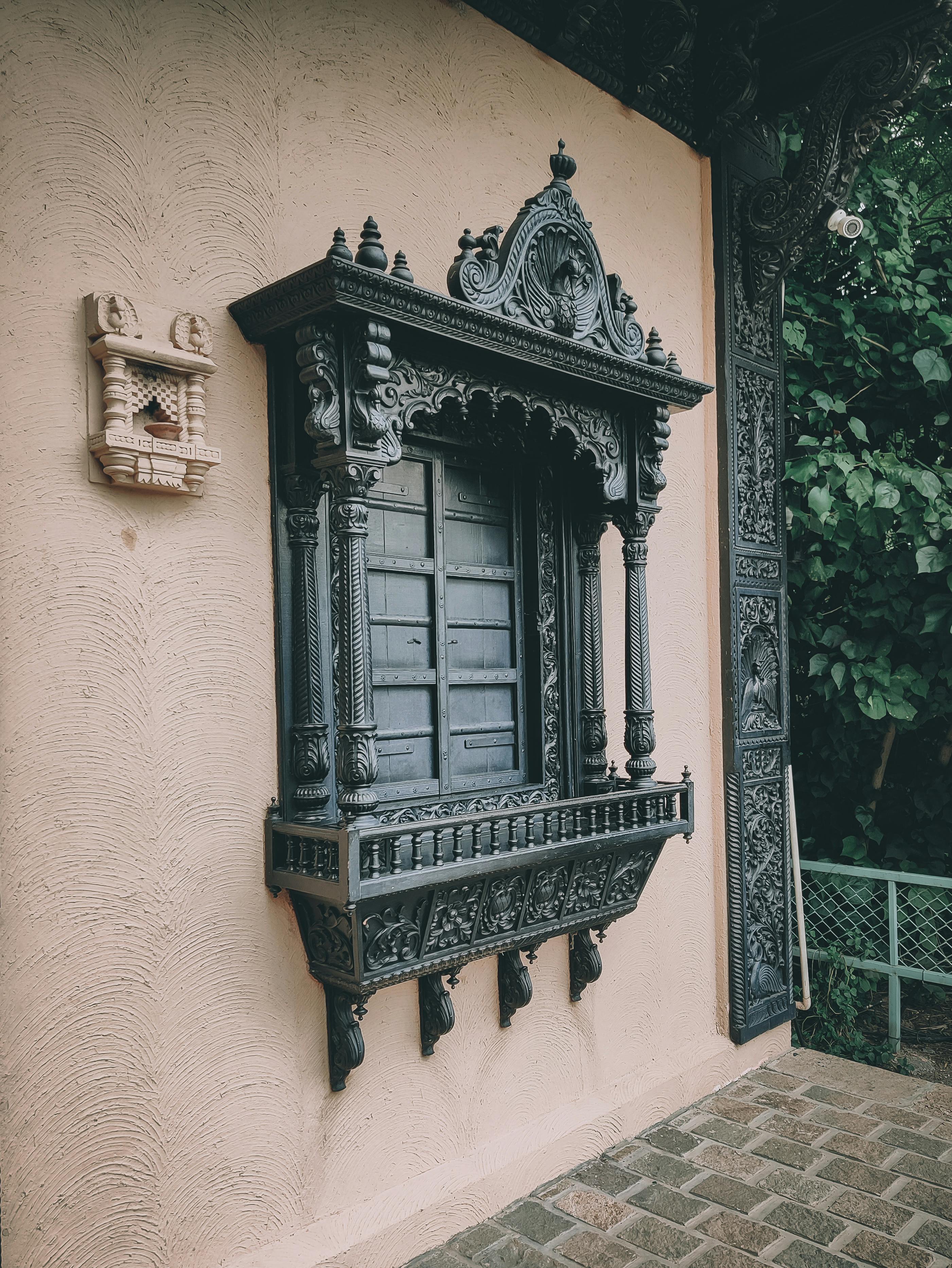 Carved Wooden Window with Shutters · Free Stock Photo