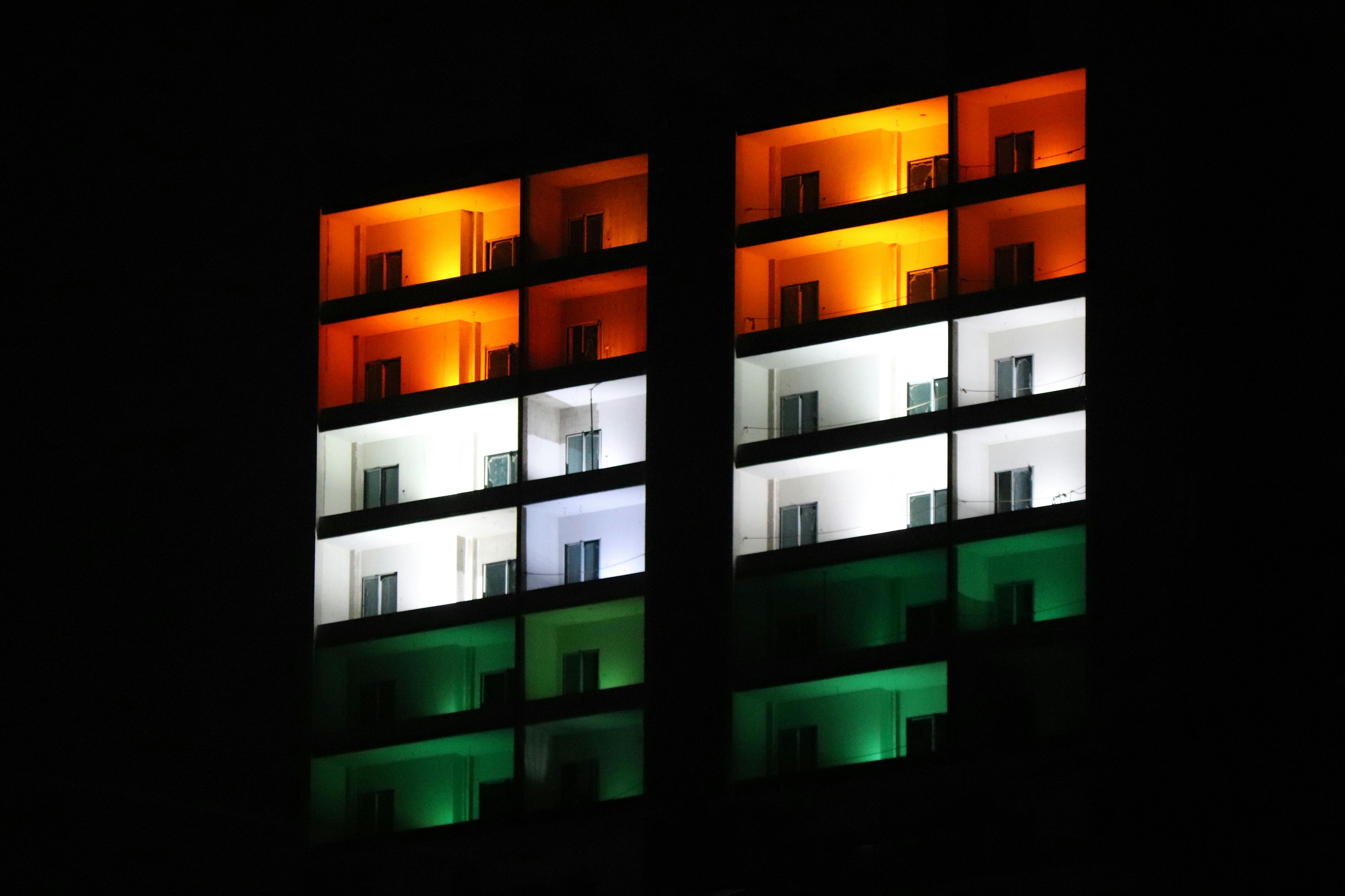 Illuminated Concrete Building · Free Stock Photo