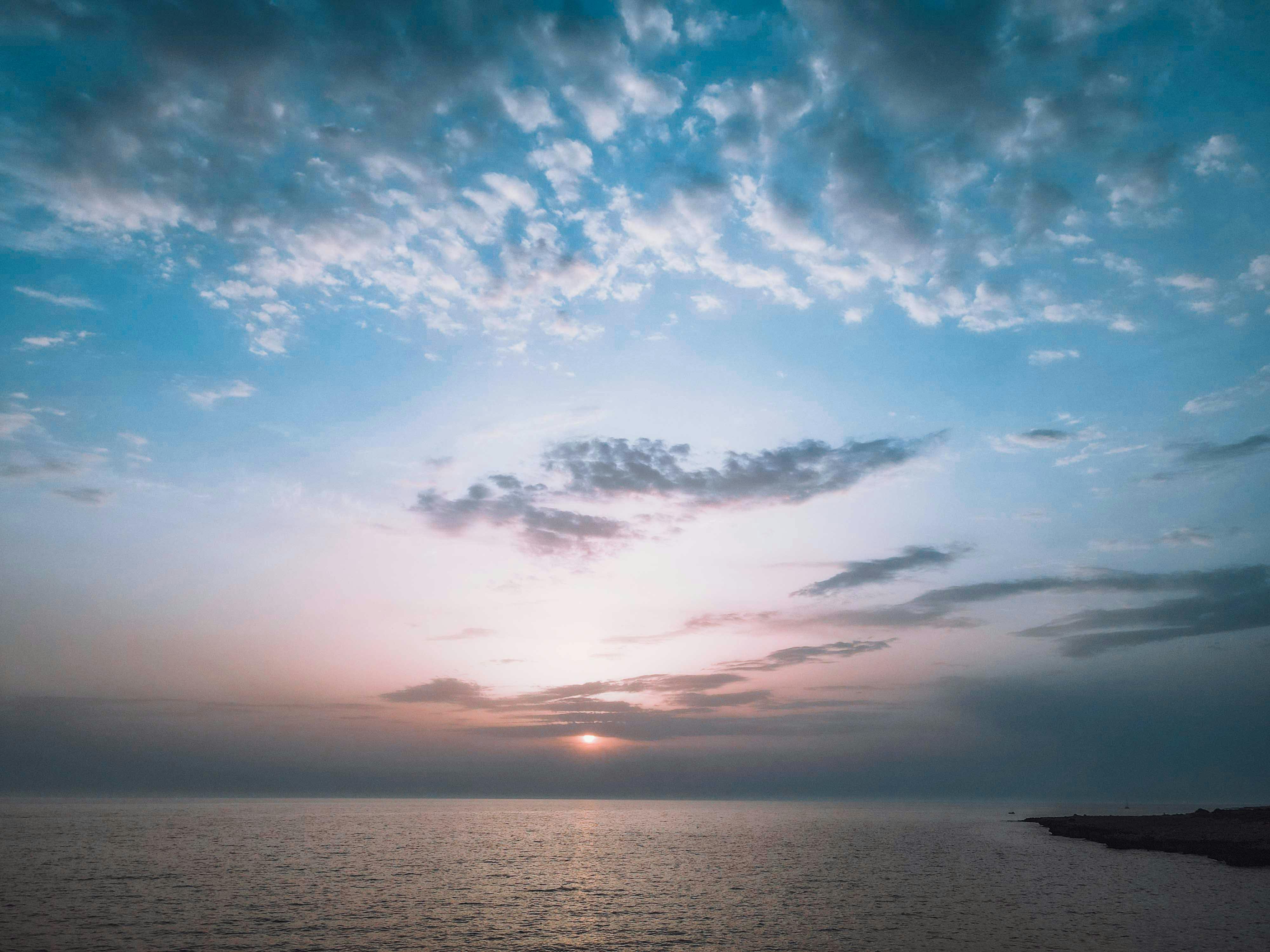 Blue Sky and White Clouds over the Sea · Free Stock Photo