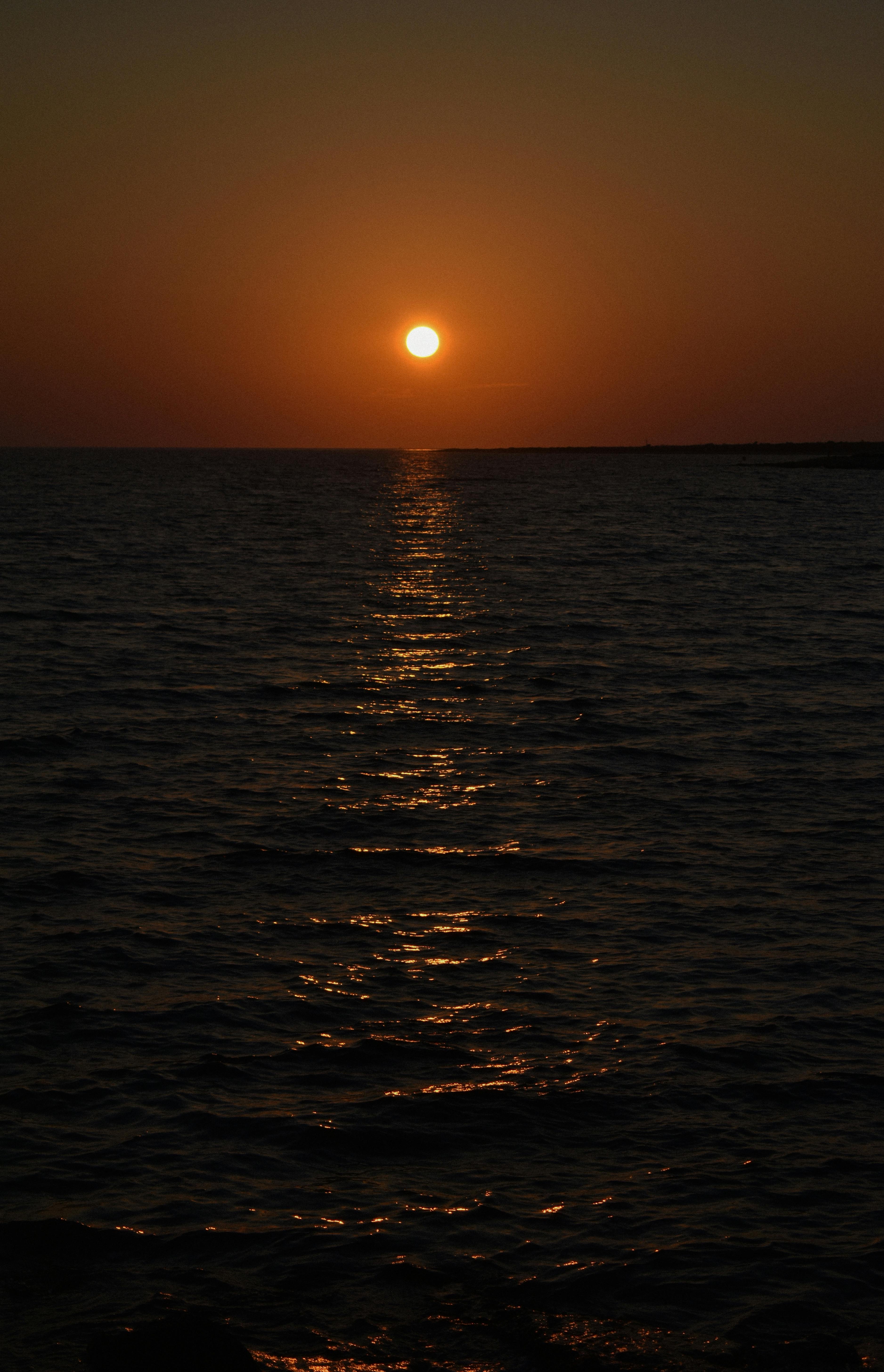 Body of Water during Sunset · Free Stock Photo