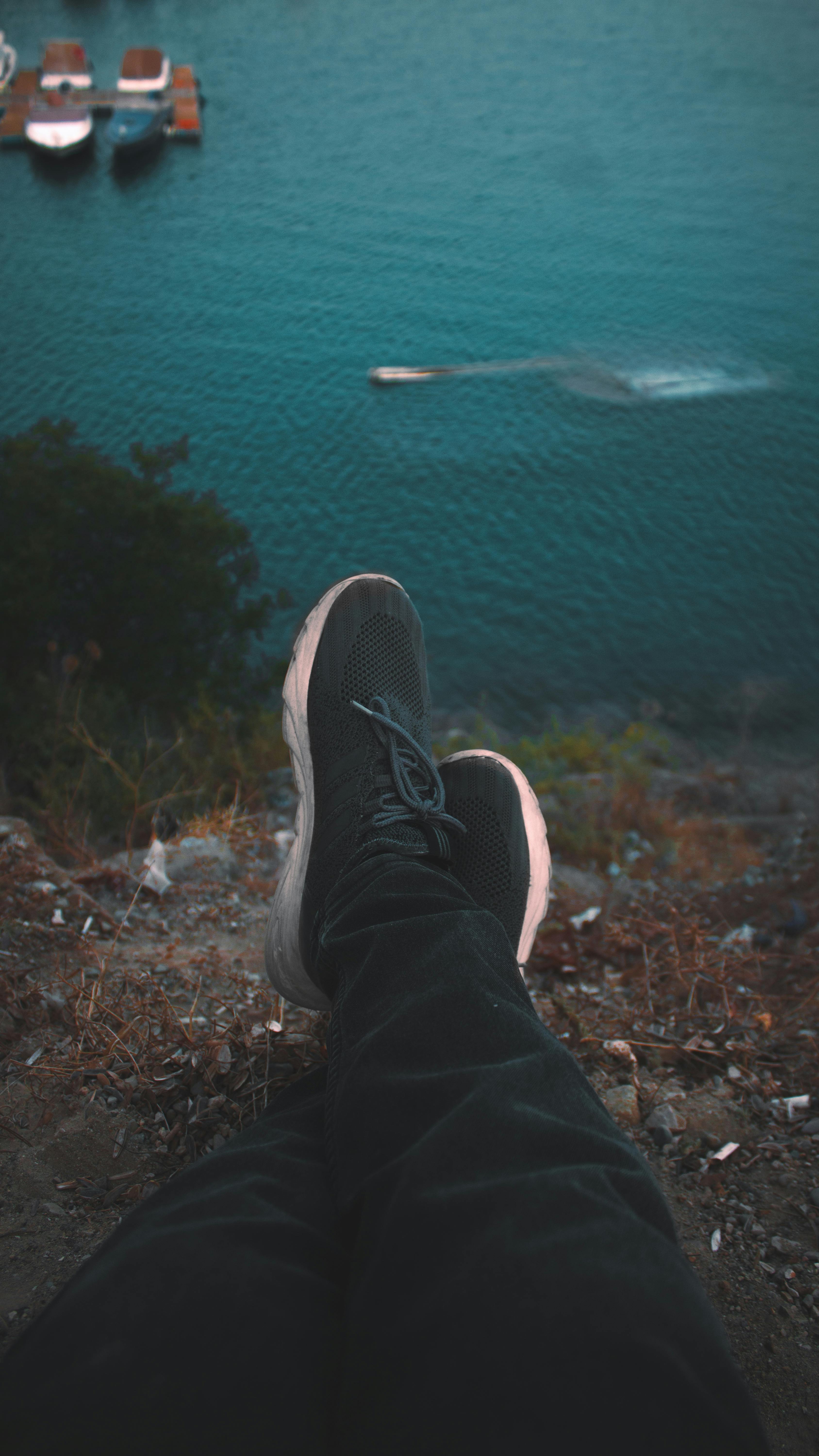 Sitting and Standing People behind Gap in Boat · Free Stock Photo
