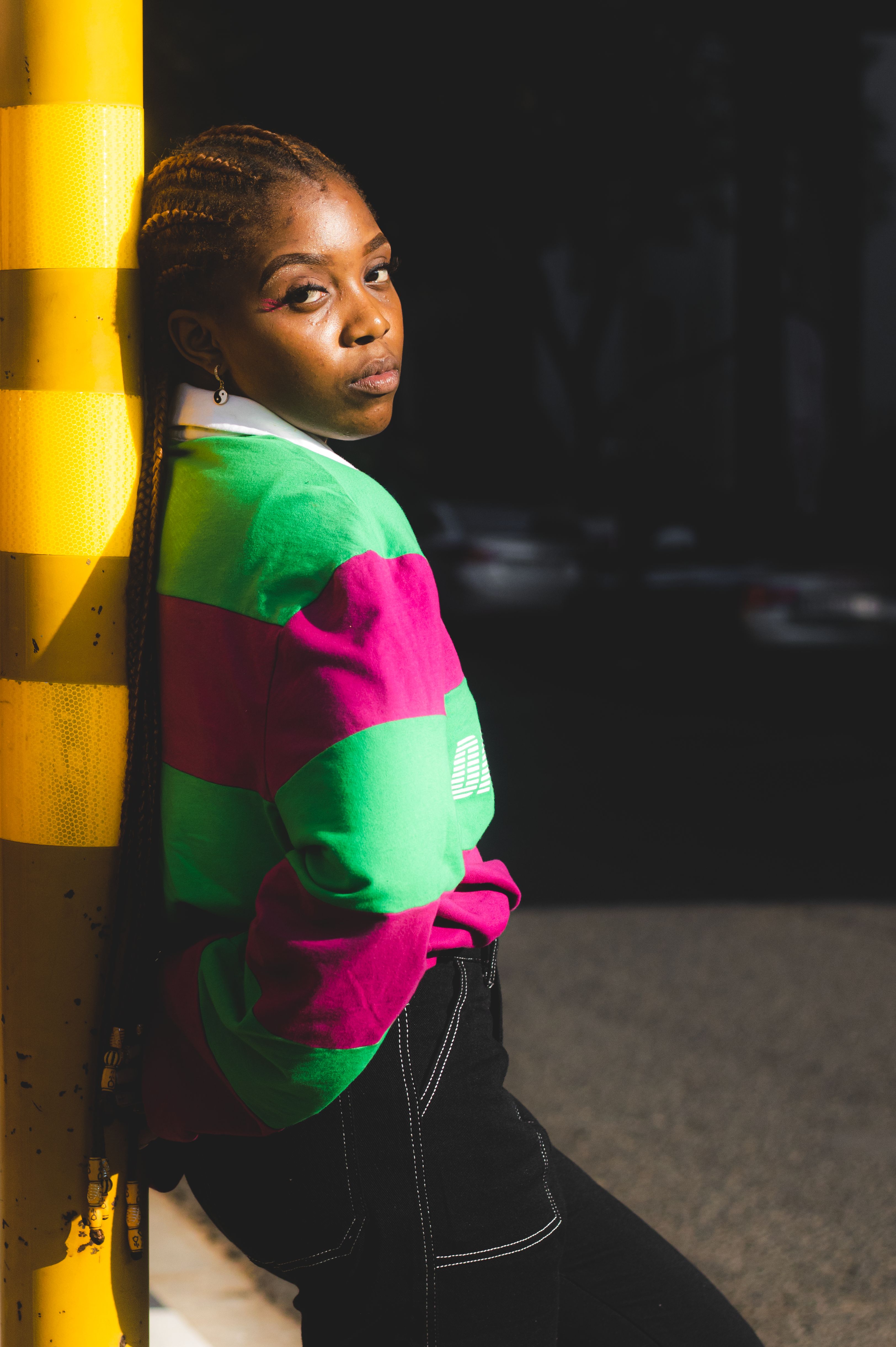 Woman Hiding behind a Newspaper · Free Stock Photo