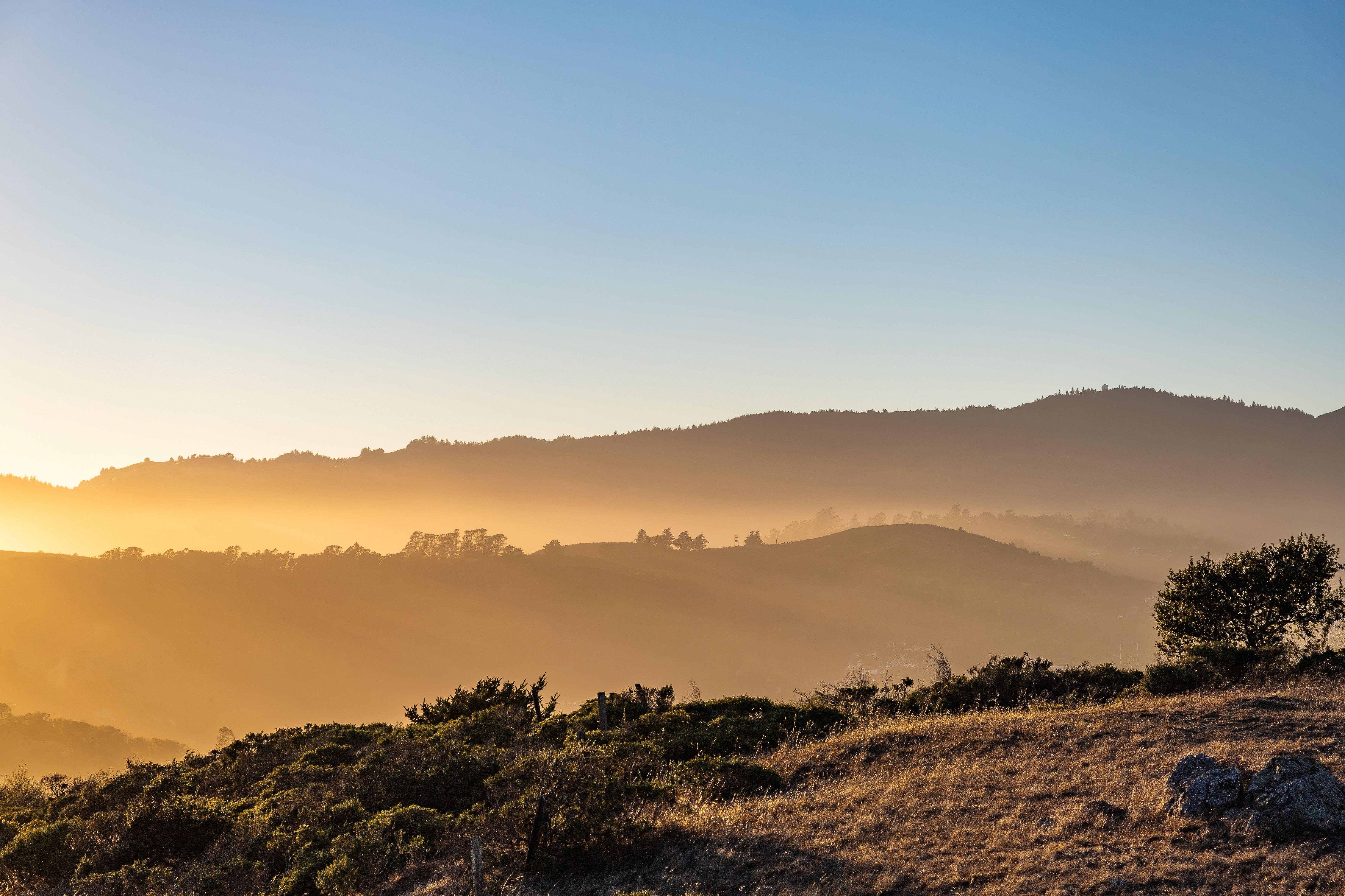 Silhouette of Hills During Golden Hour · Free Stock Photo