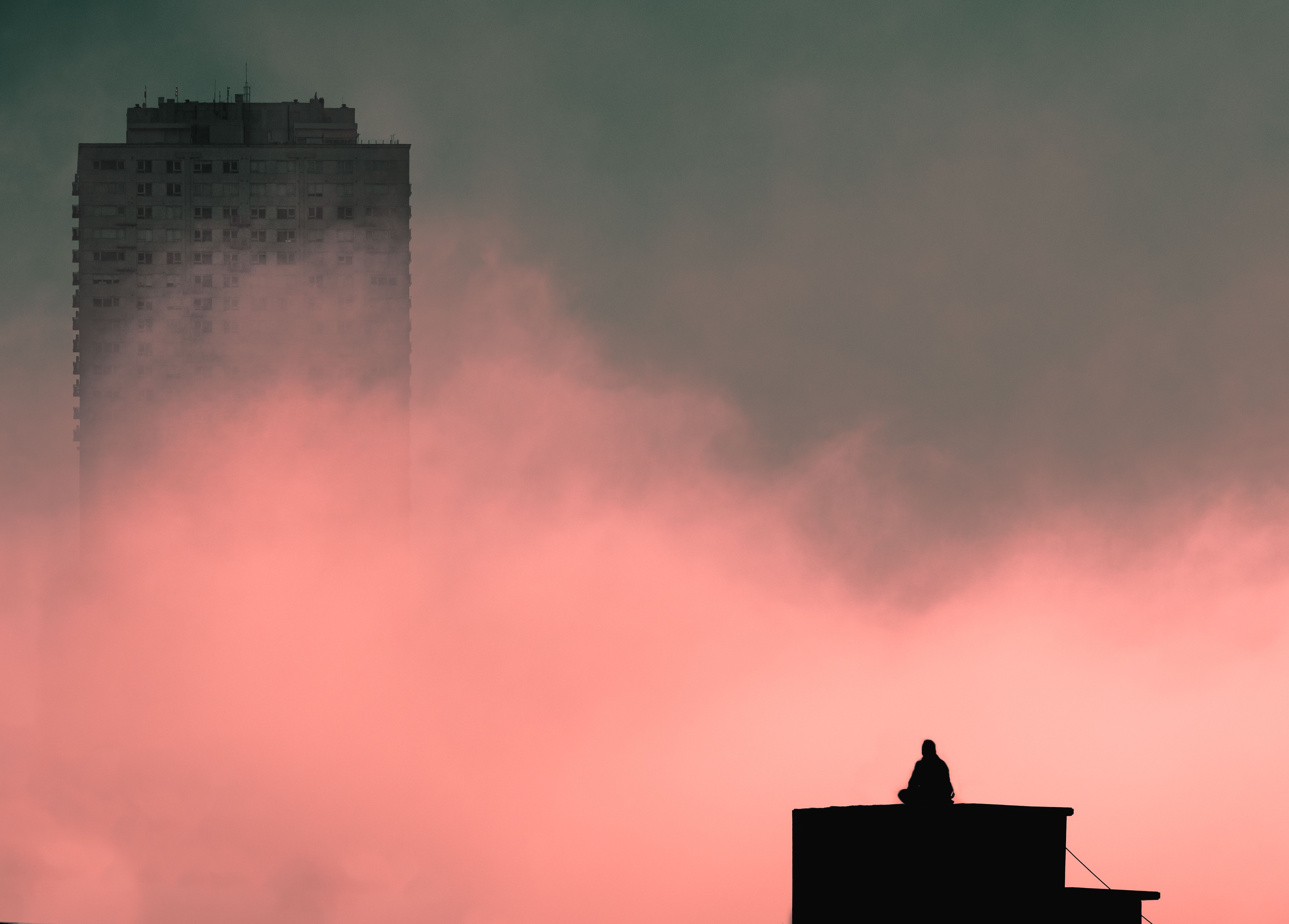 Silhouette Buildings Covered with Haze · Free Stock Photo