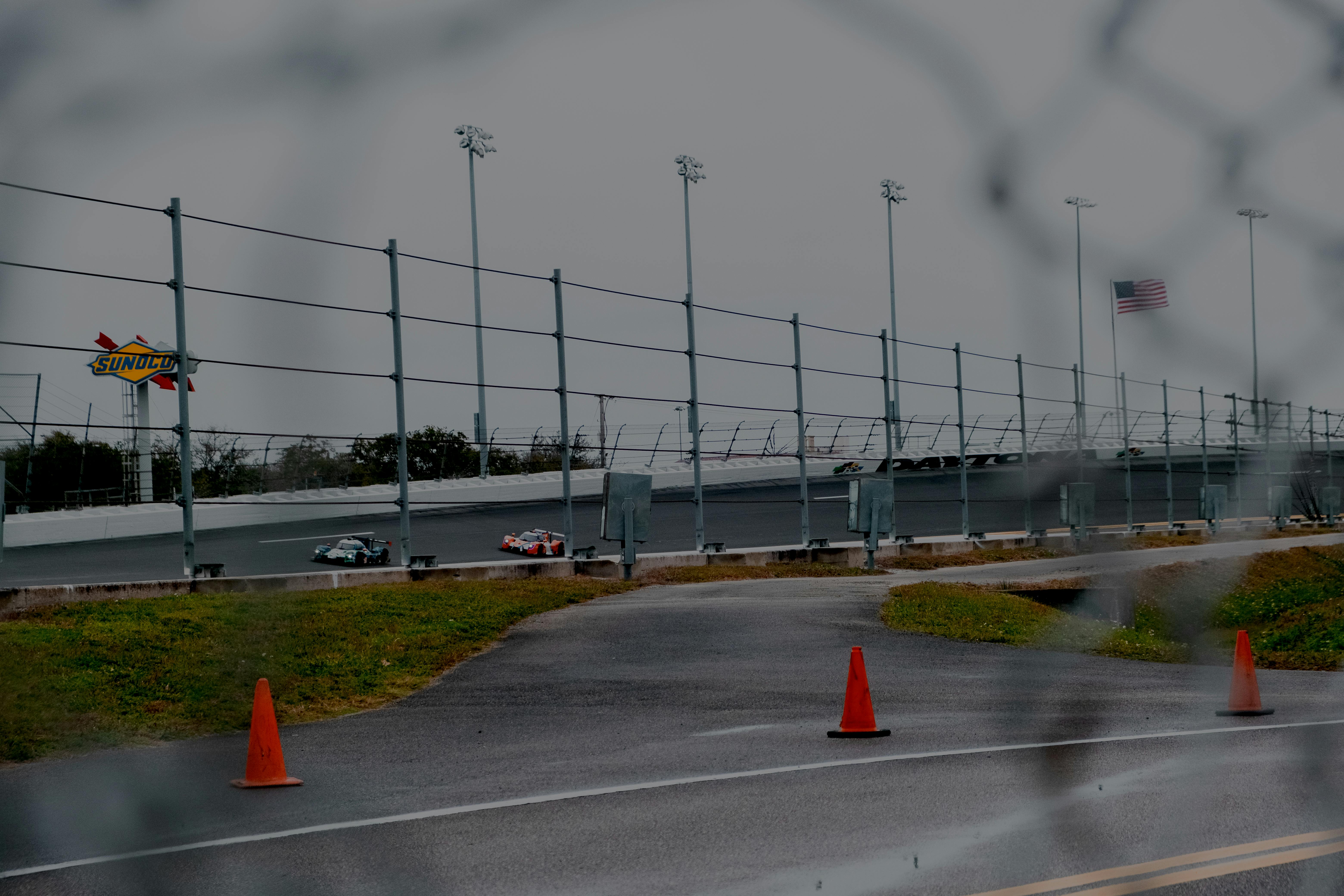 Cars Racing on a Race Track · Free Stock Photo