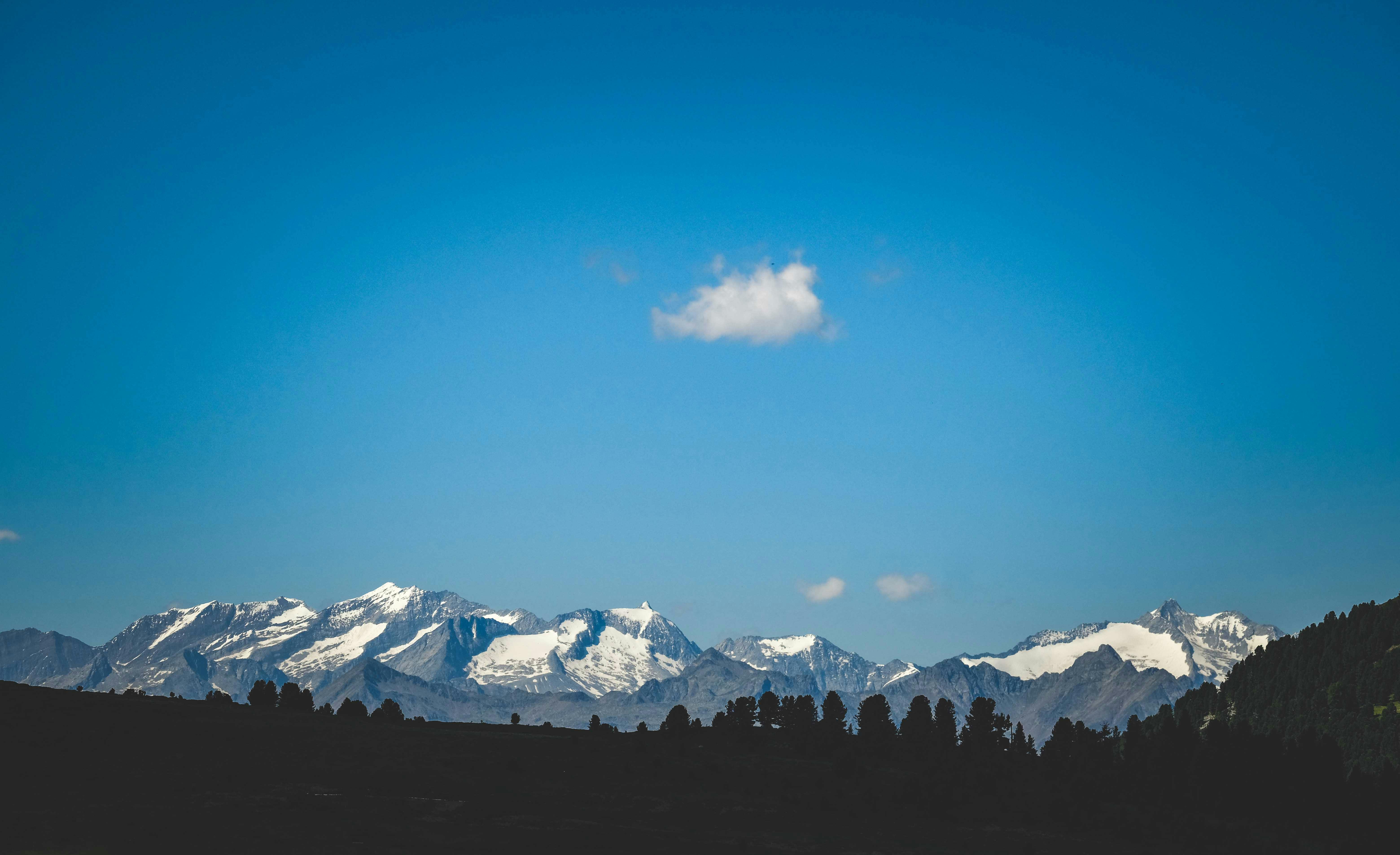 Majestic Mountains Landscape under Lone Cloud · Free Stock Photo