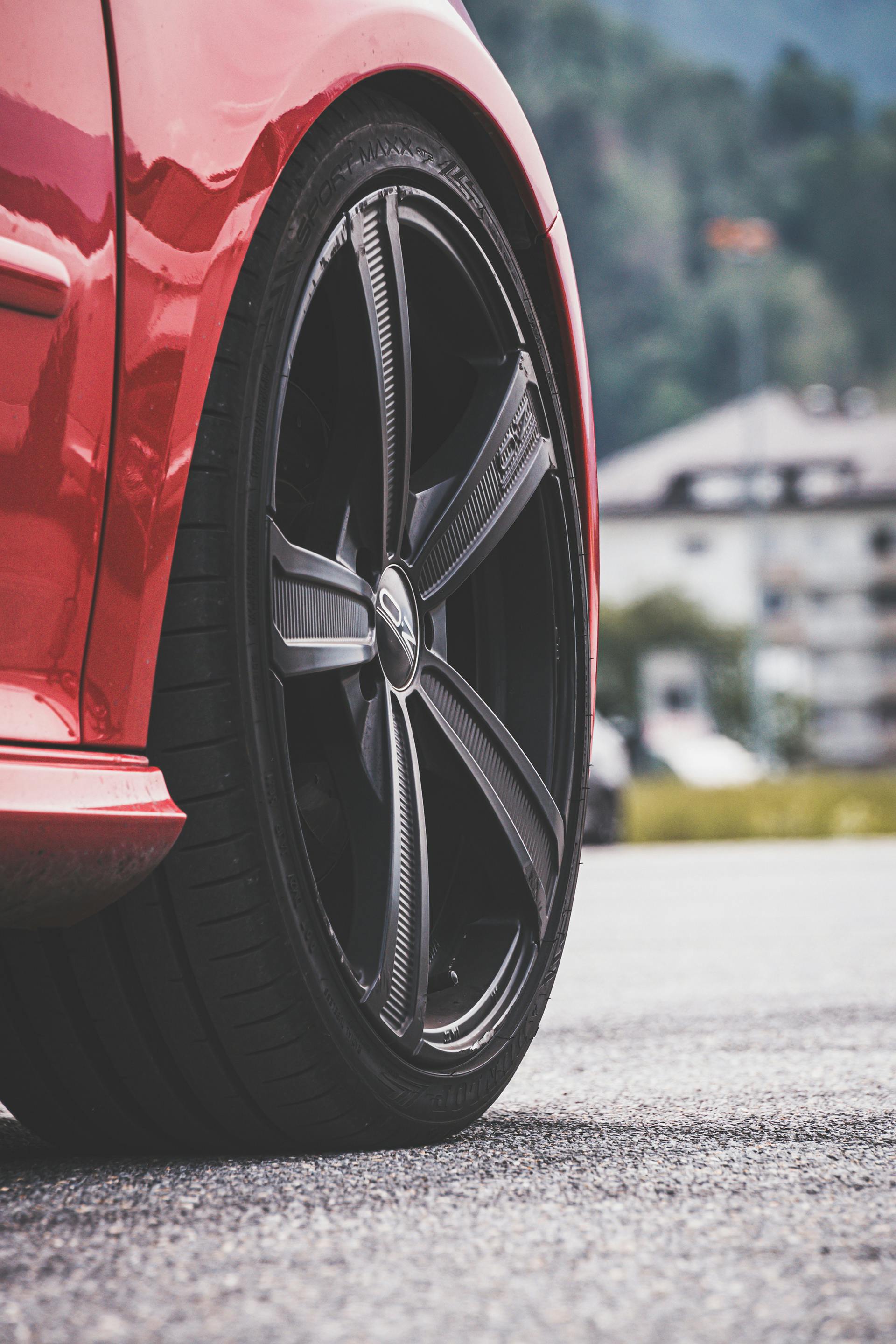 Close-Up Photo of Ferrari Rim · Free Stock Photo