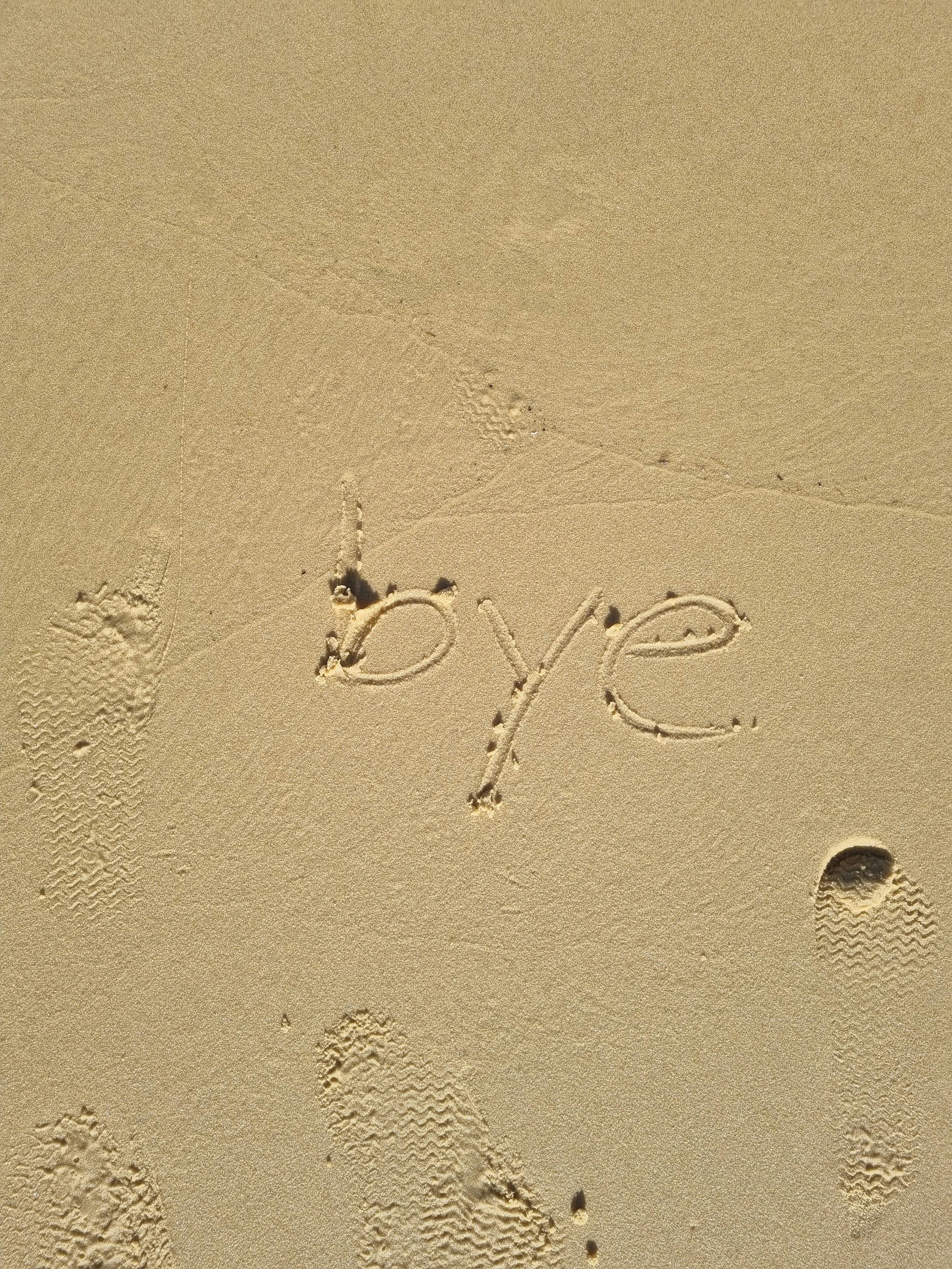 Bye Written in Sand · Free Stock Photo
