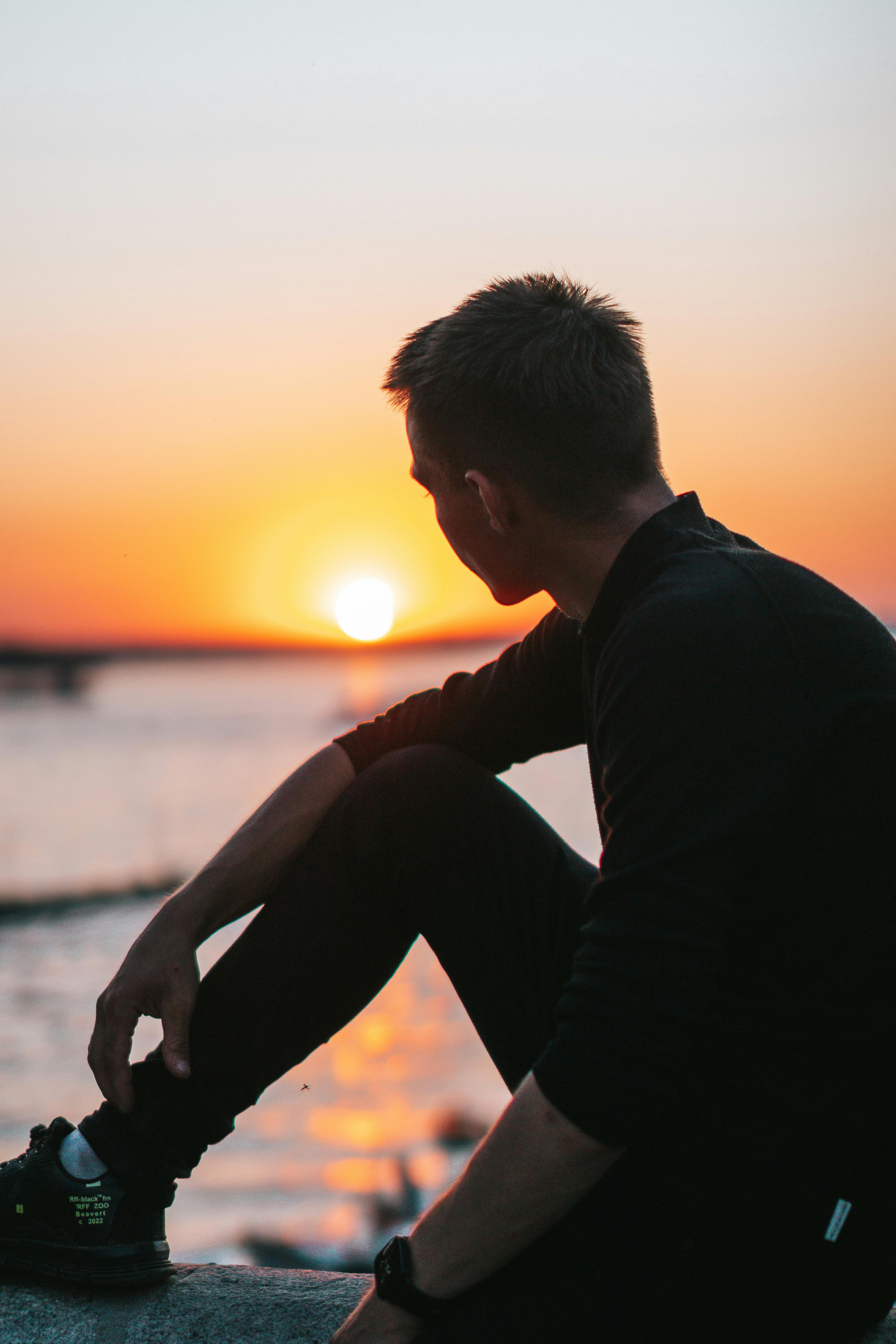 Empty Road Between Concrete Houses Under Blue Sky · Free Stock Photo