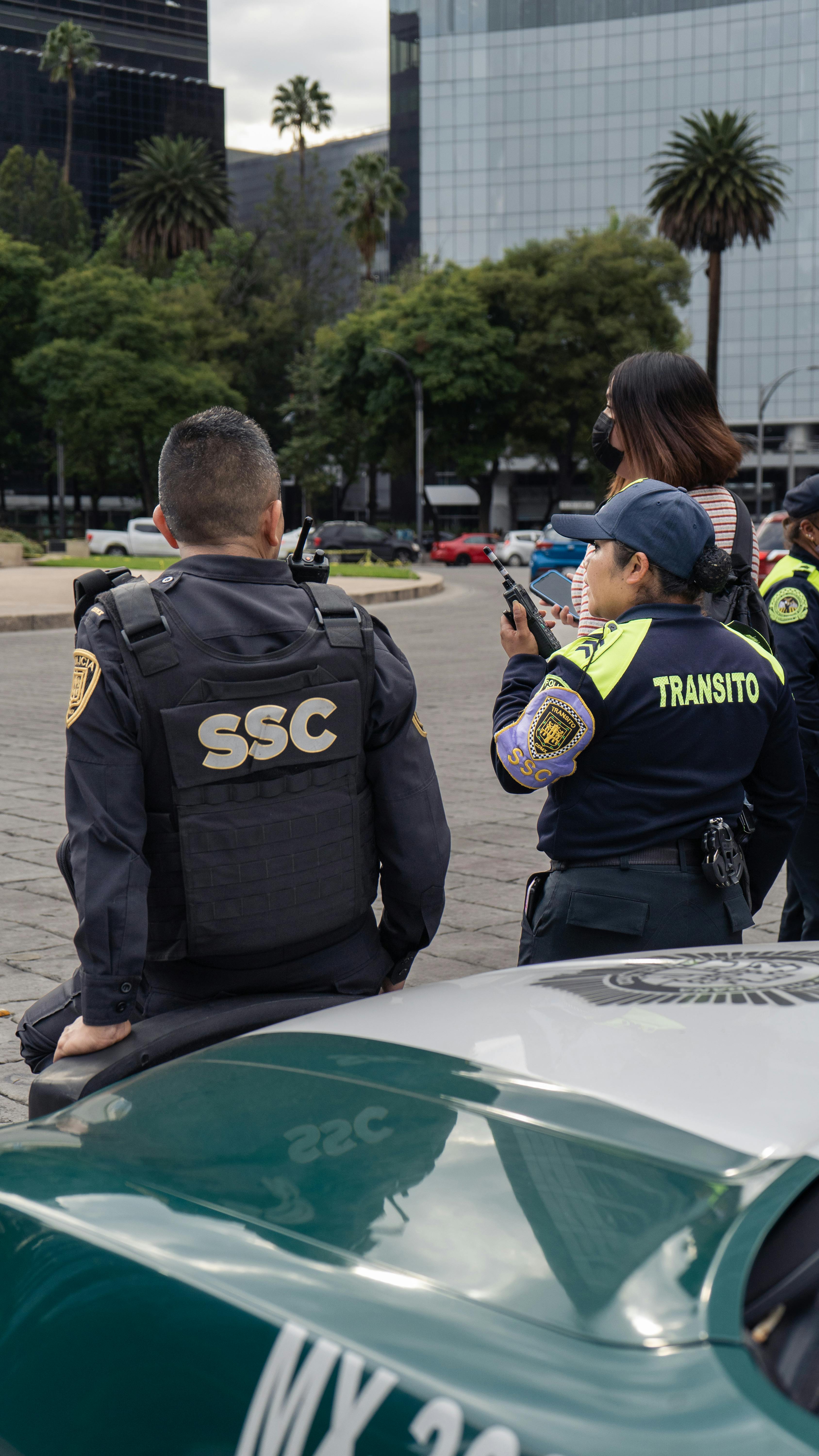 Police Officers Inside a Police Car · Free Stock Photo