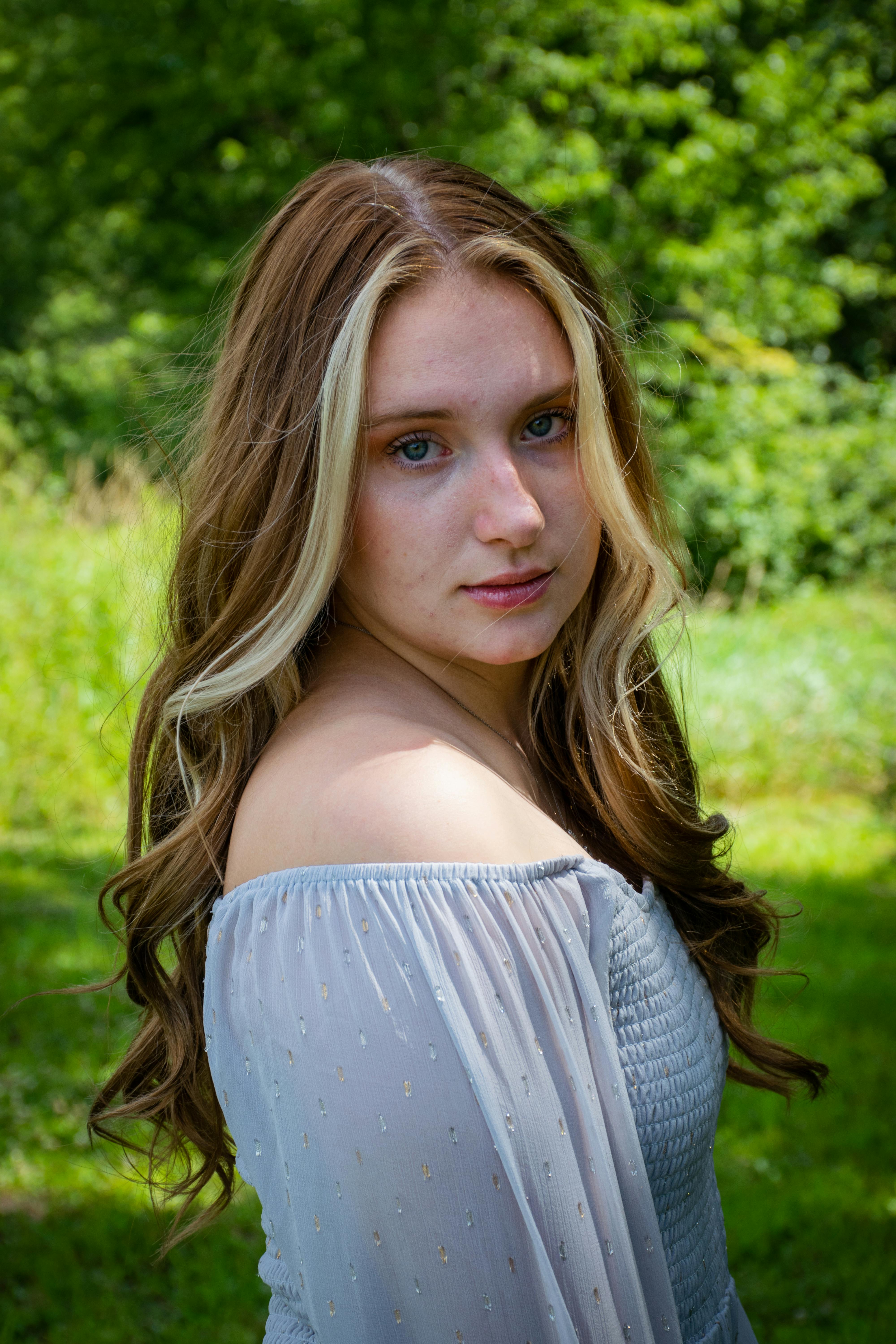 Young Woman in Off Shoulder Dress · Free Stock Photo