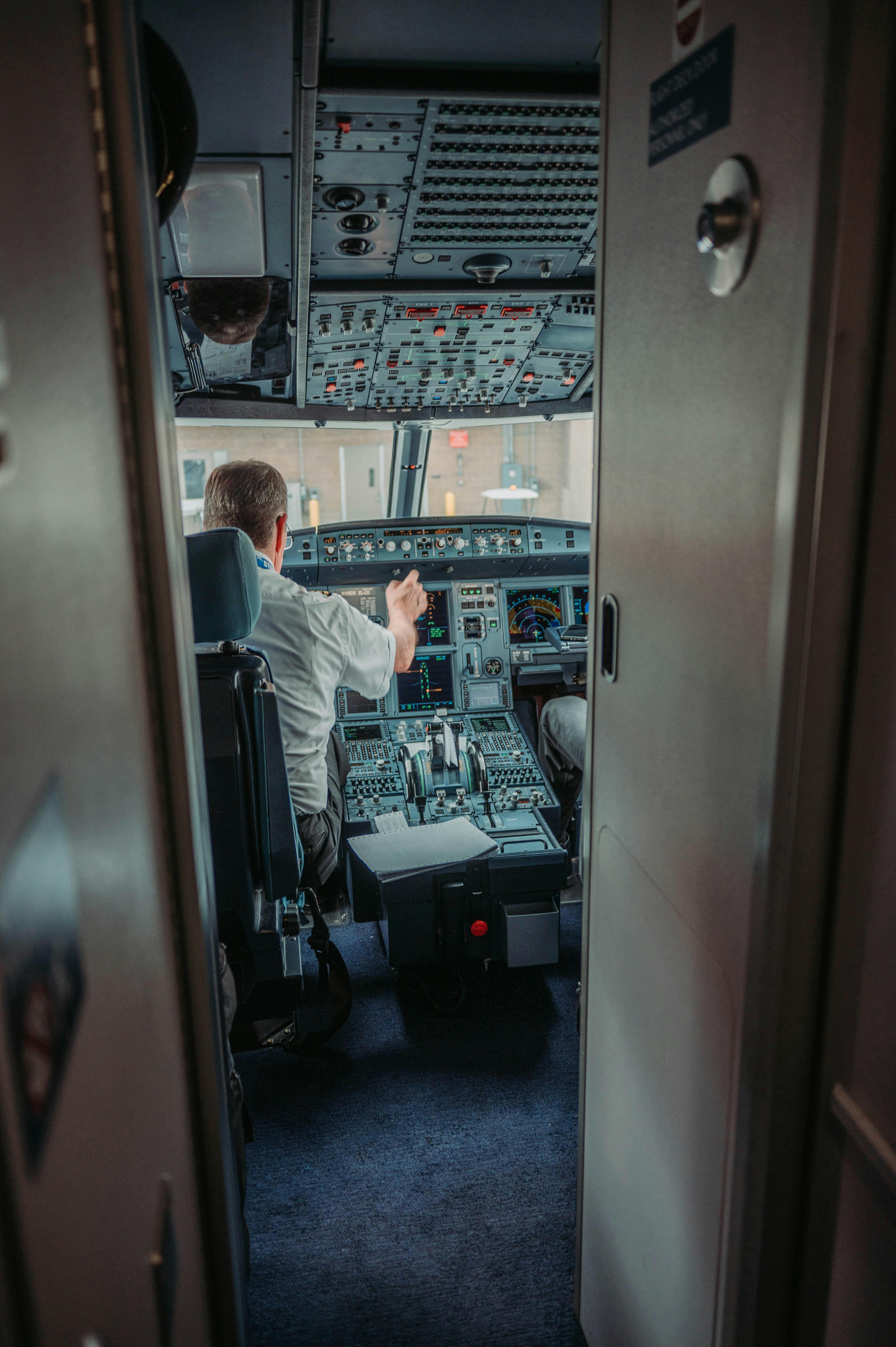 Pilot Sitting in Cockpit · Free Stock Photo