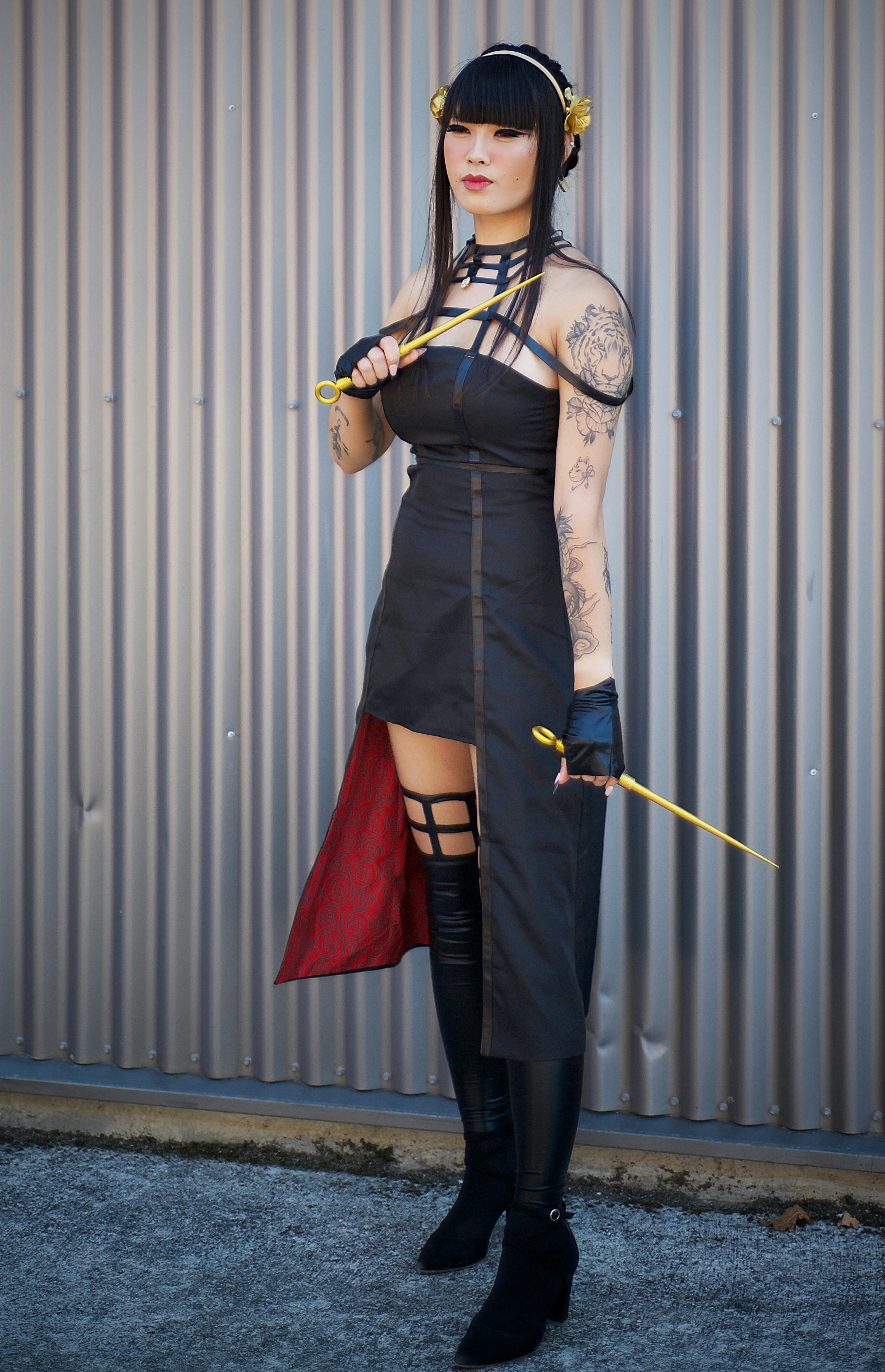 Person in Superhero Cosplay Sitting on Ground · Free Stock Photo