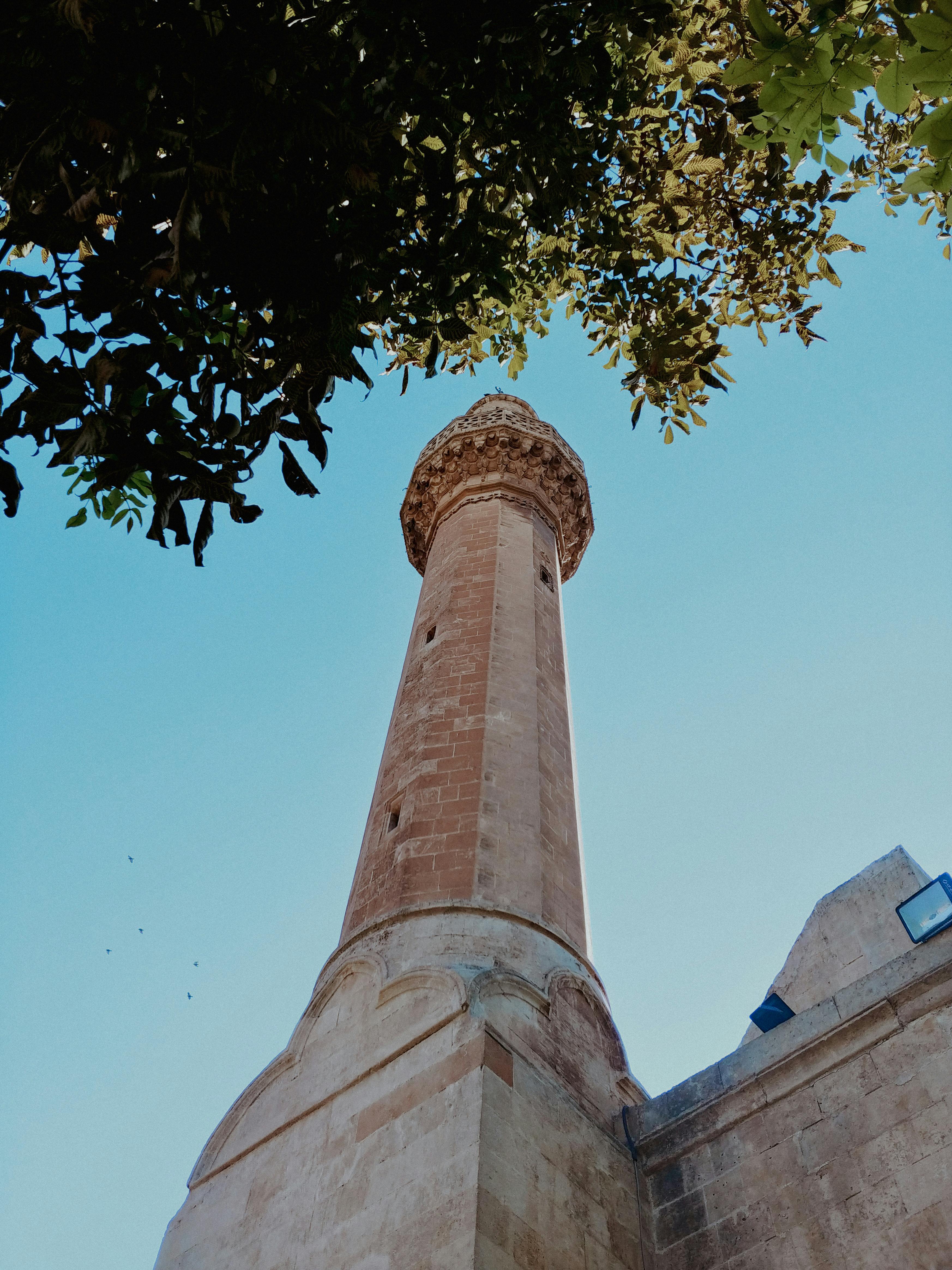 Stone Tower Building on Blue Sky · Free Stock Photo