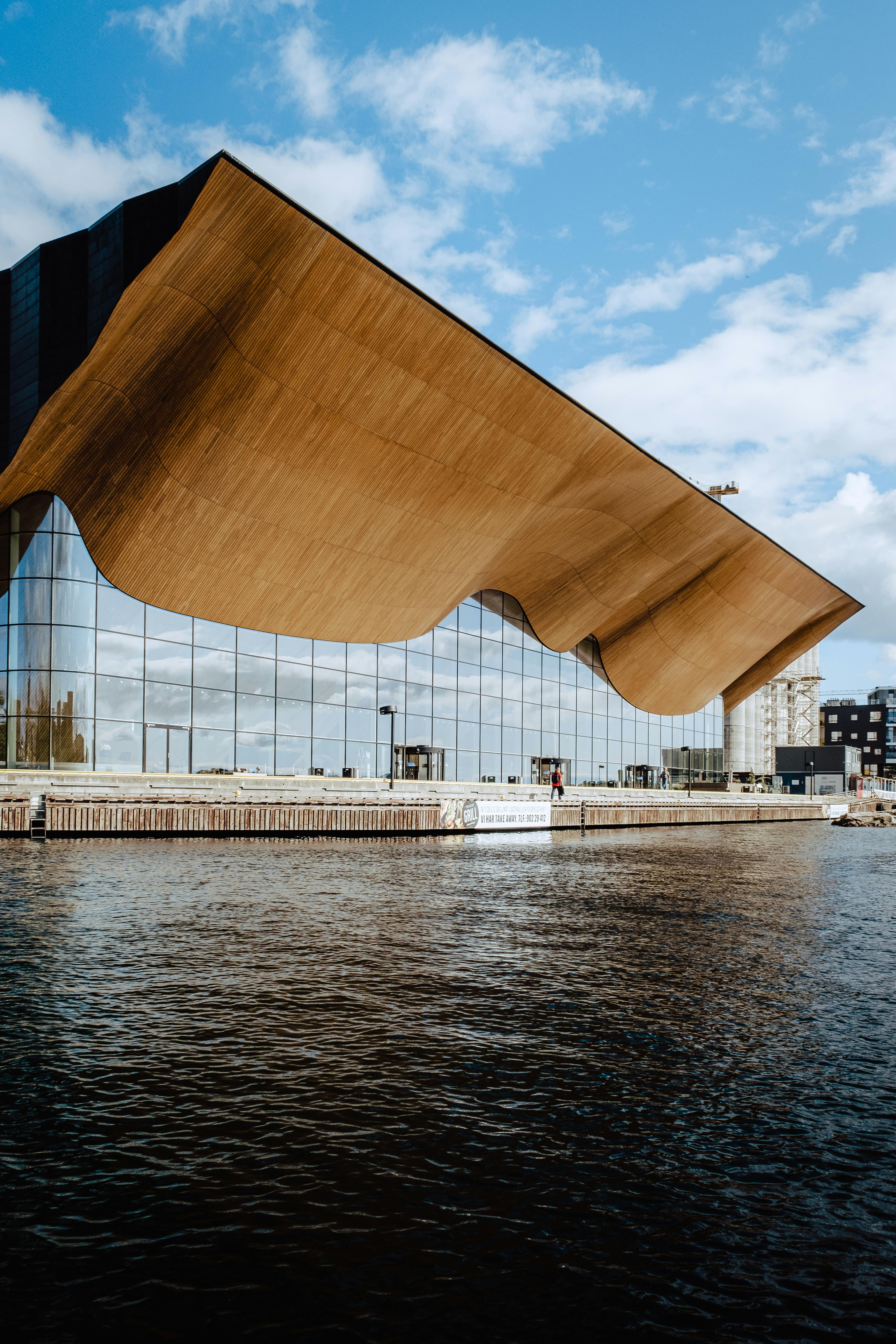 Photo of a Modern Waterfront Building · Free Stock Photo
