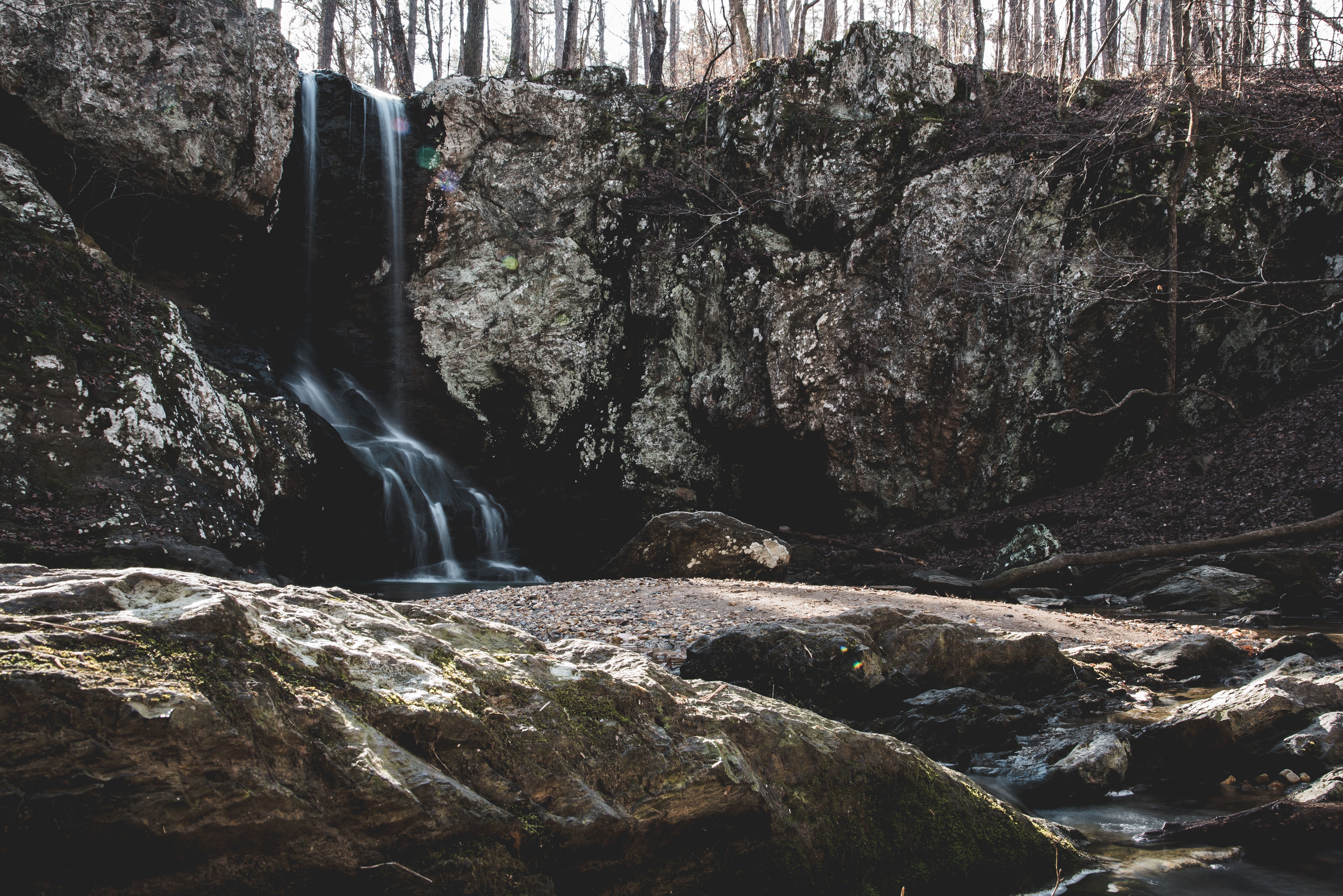 A Waterfall on a Rock Formation · Free Stock Photo