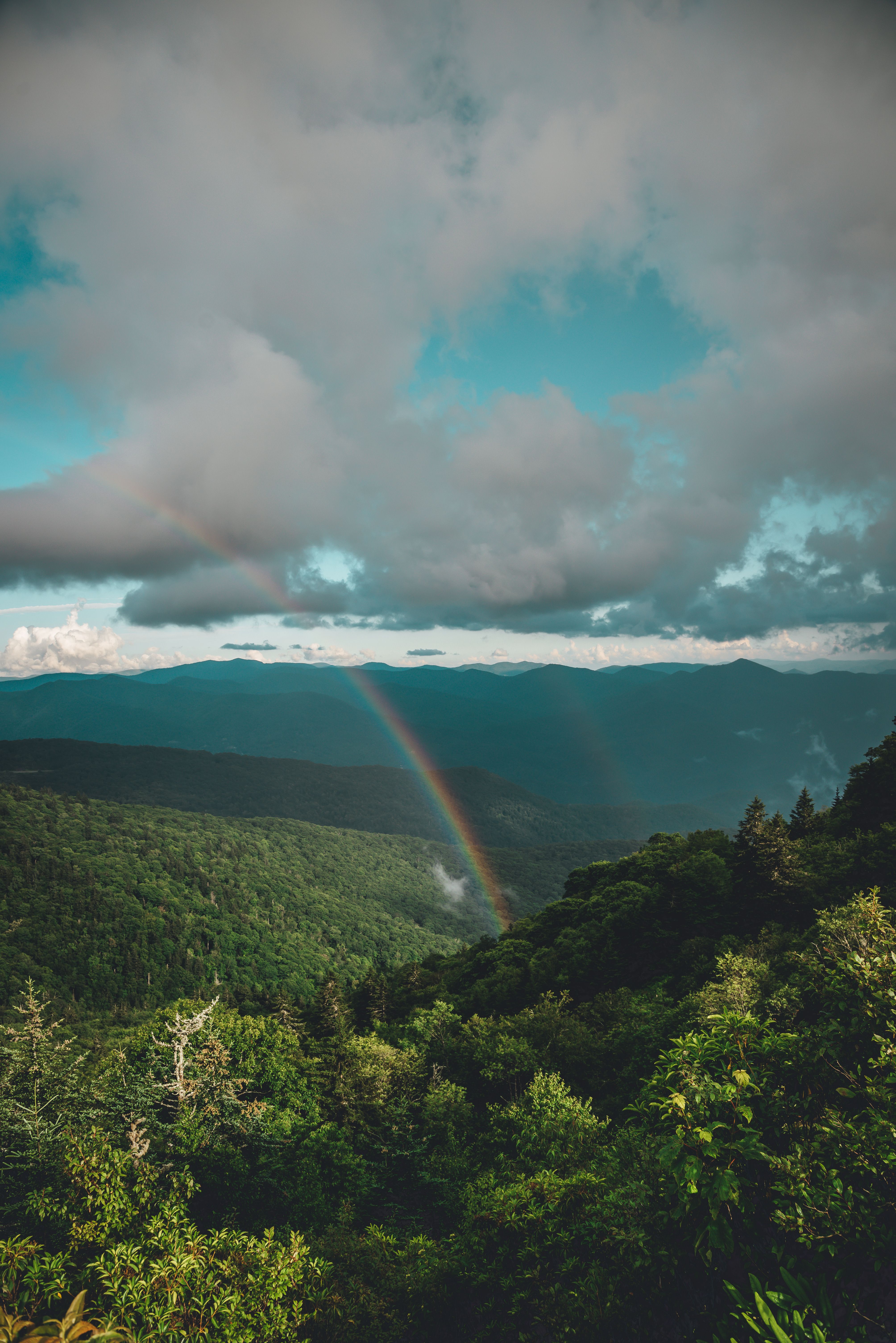 Photo of Rainbow Near Mountain · Free Stock Photo