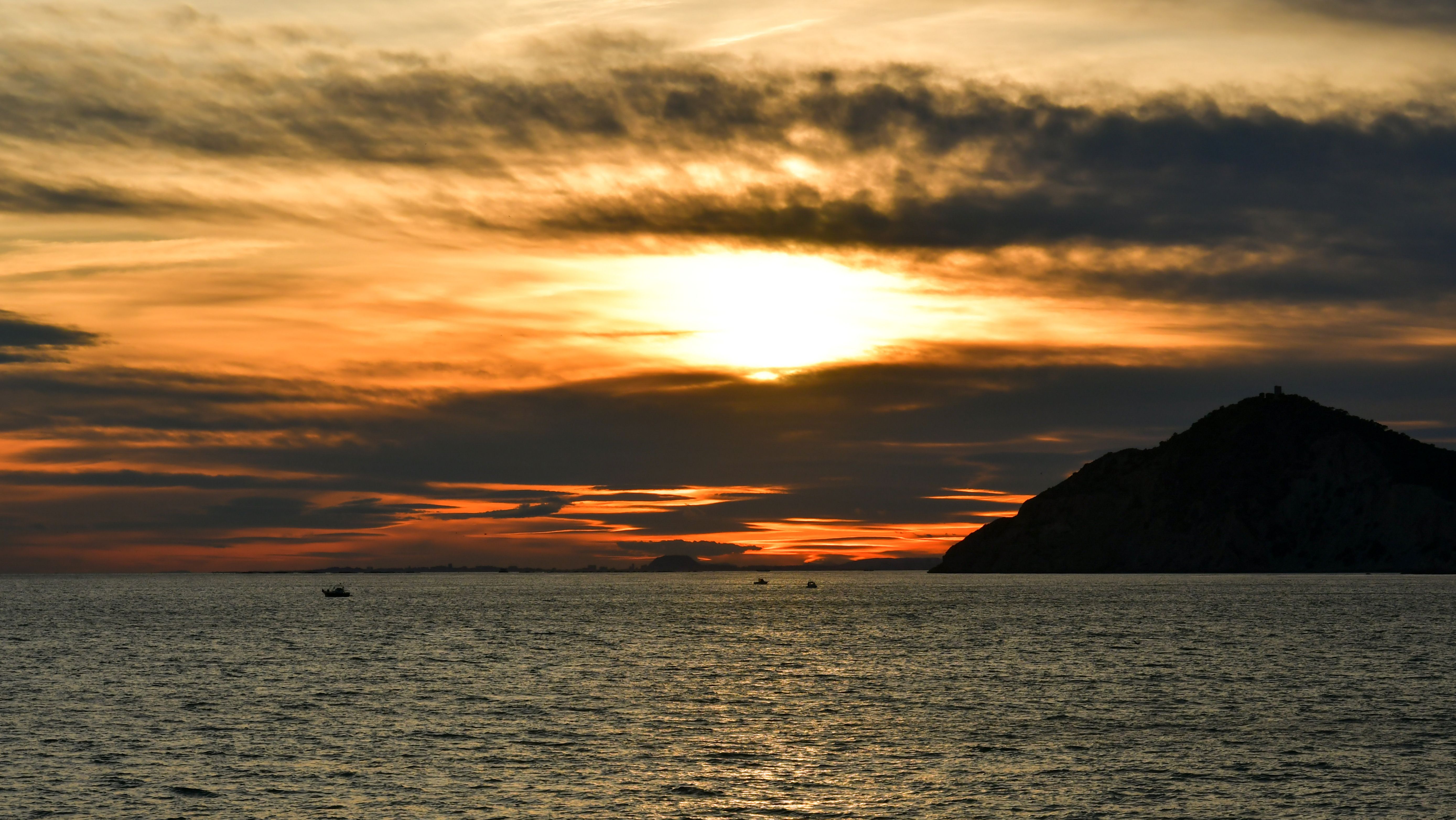 Sun Rays over Sea With Islands · Free Stock Photo