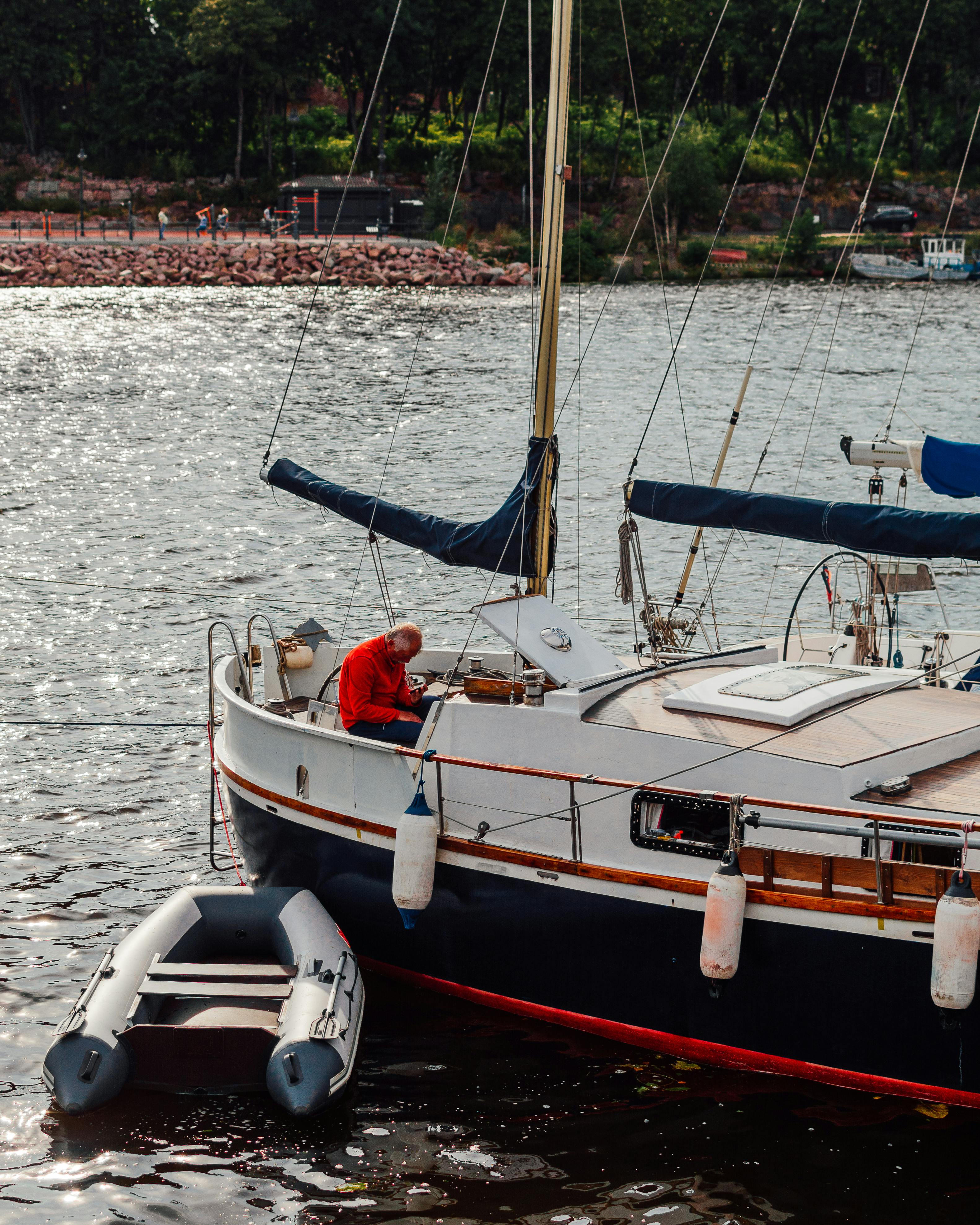 A canadian flag flying on a boat · Free Stock Photo