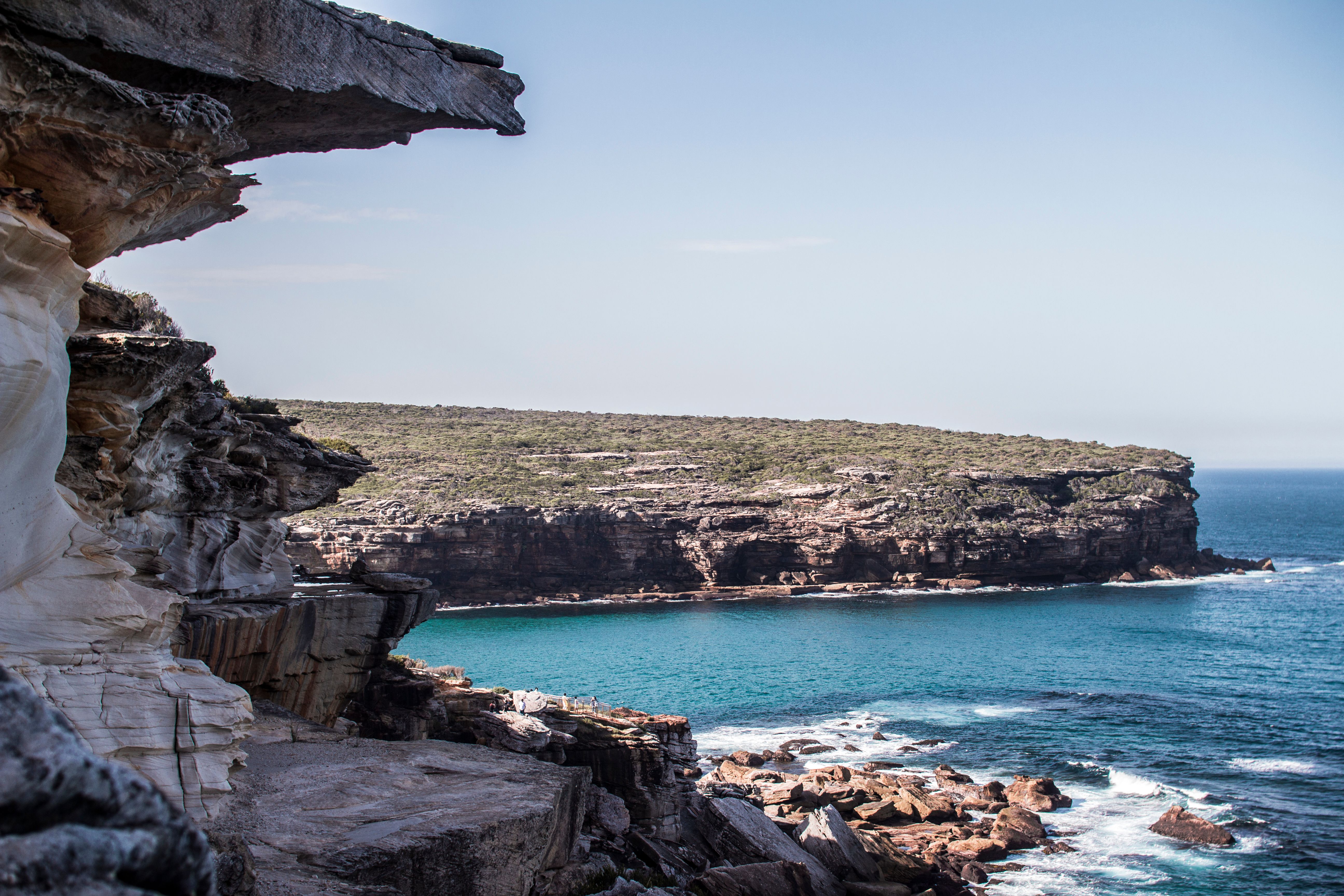 Rock Cliff Beside the Ocean · Free Stock Photo