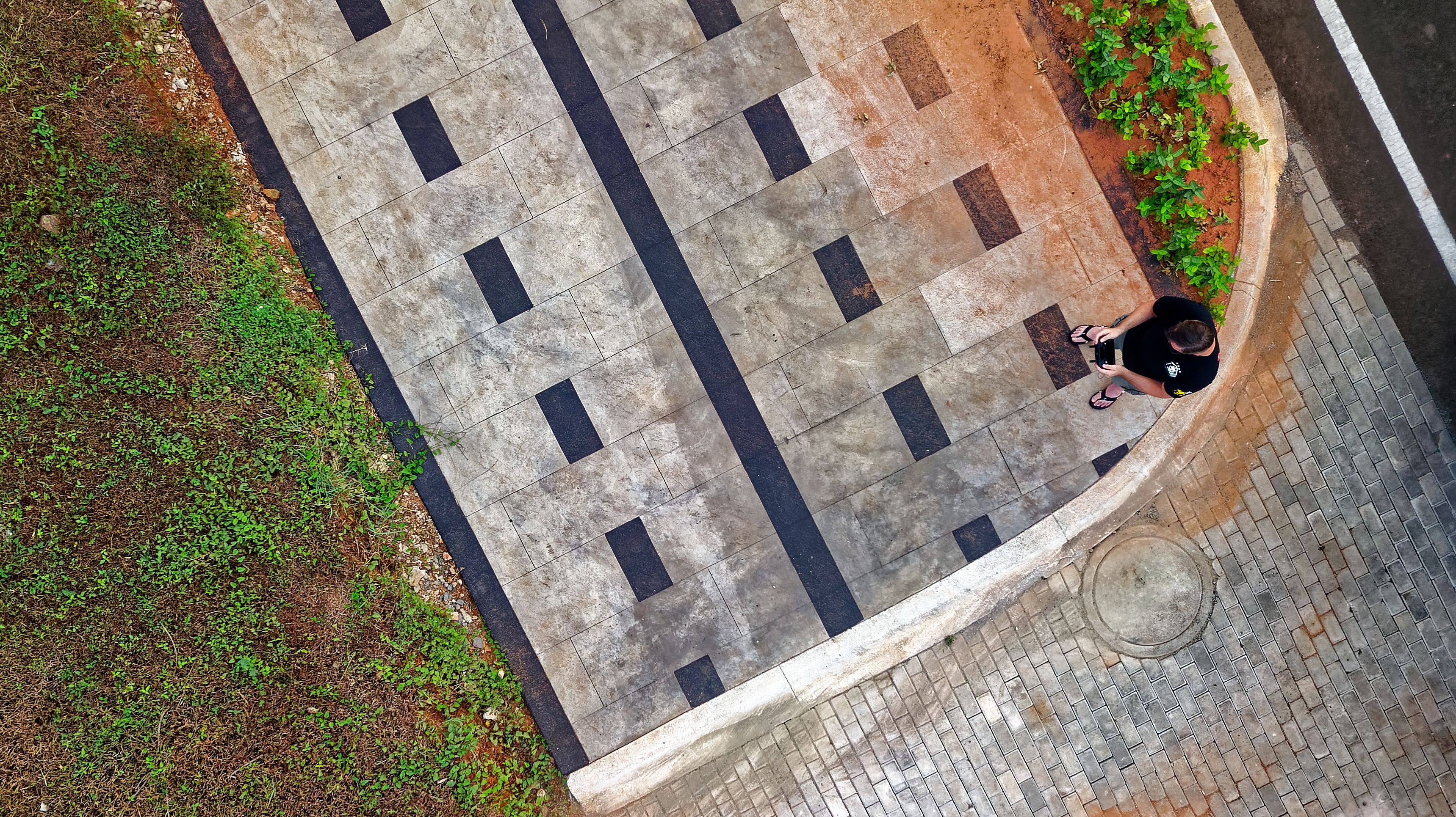 Man Standing on Pavement · Free Stock Photo