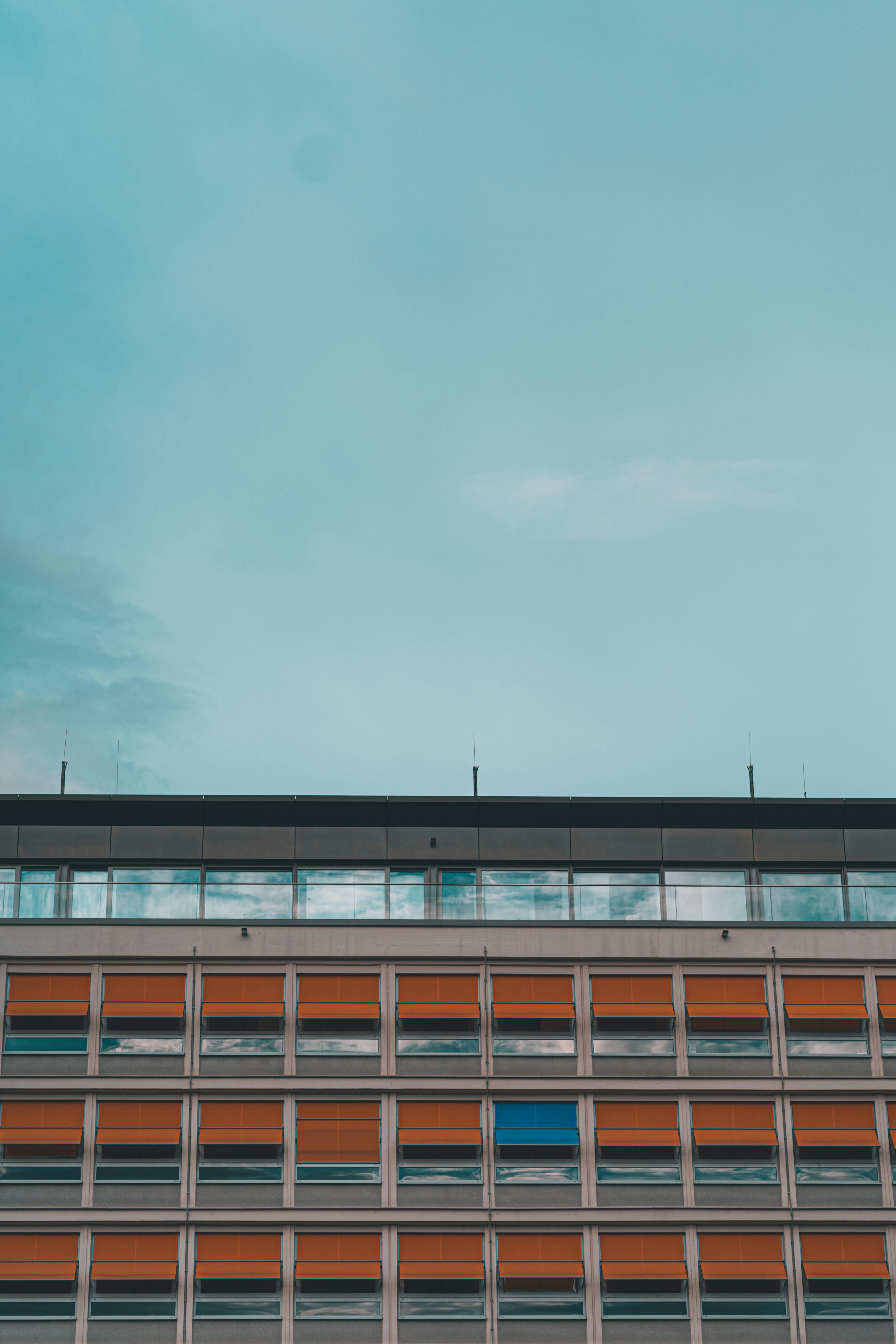 Exterior Glass Windows Design of a Building · Free Stock Photo