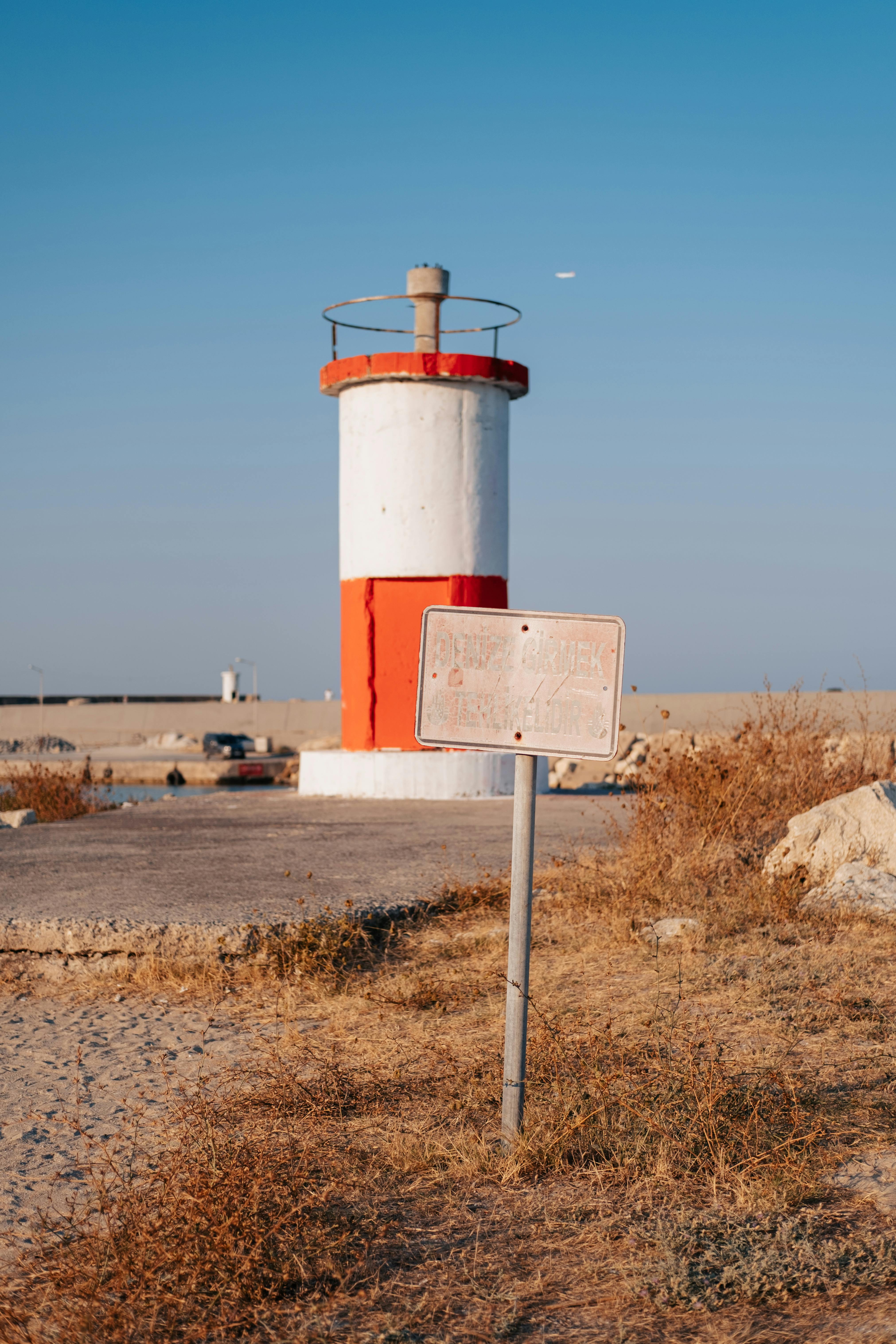 Blue and White Lighthouse Photo · Free Stock Photo