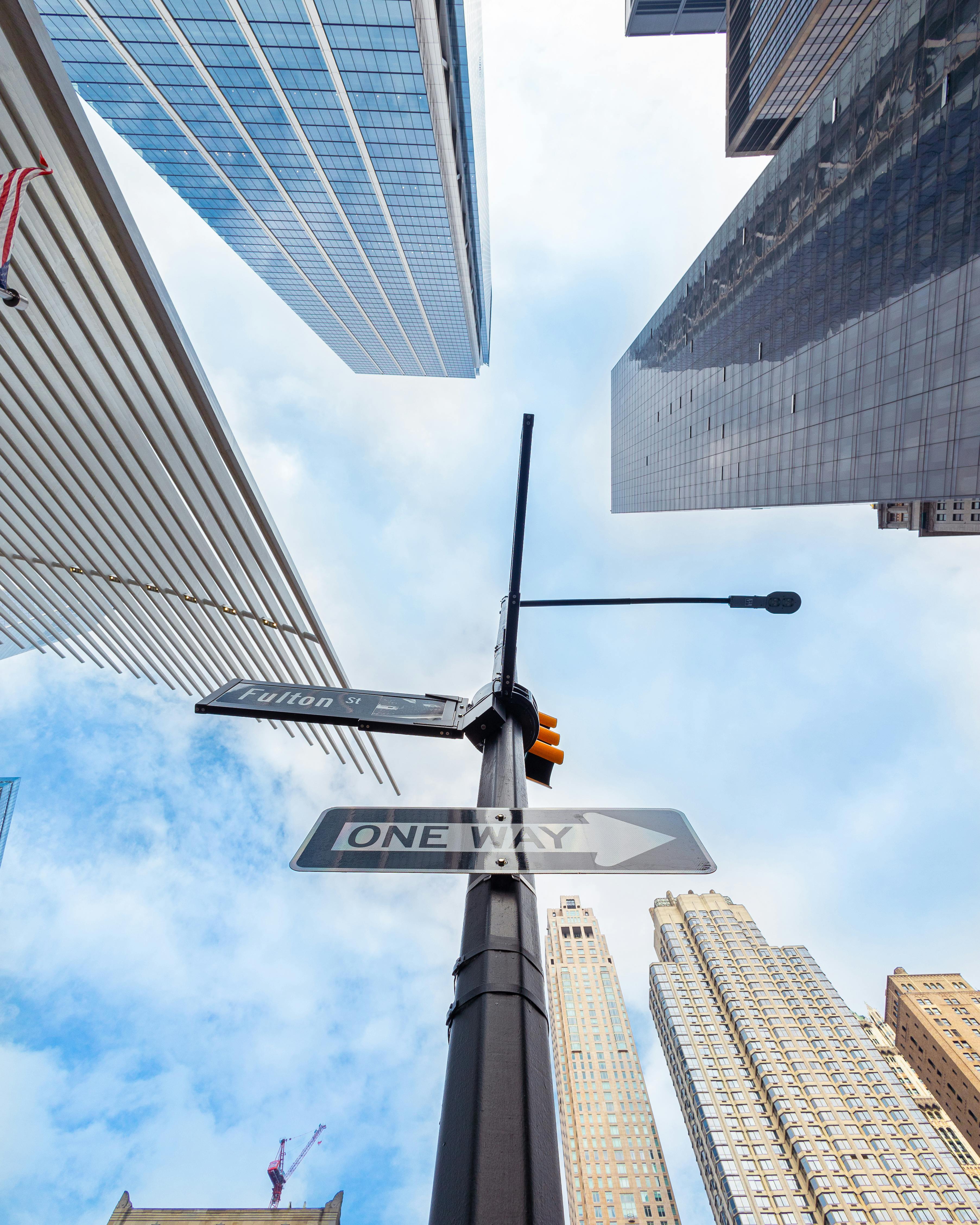 Signs on a Street Light · Free Stock Photo