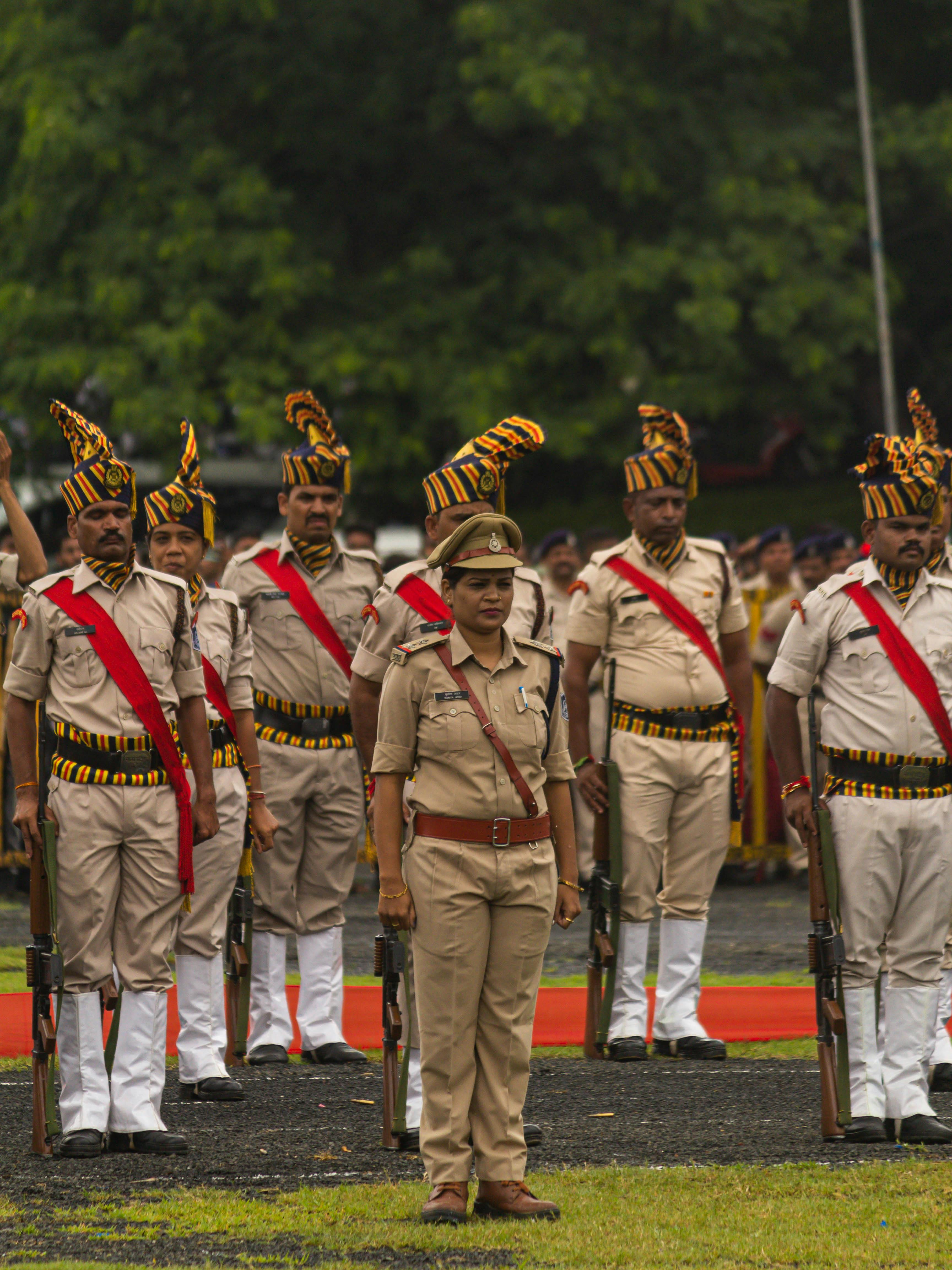 Two Police Officers Walking on the Pathway · Free Stock Photo