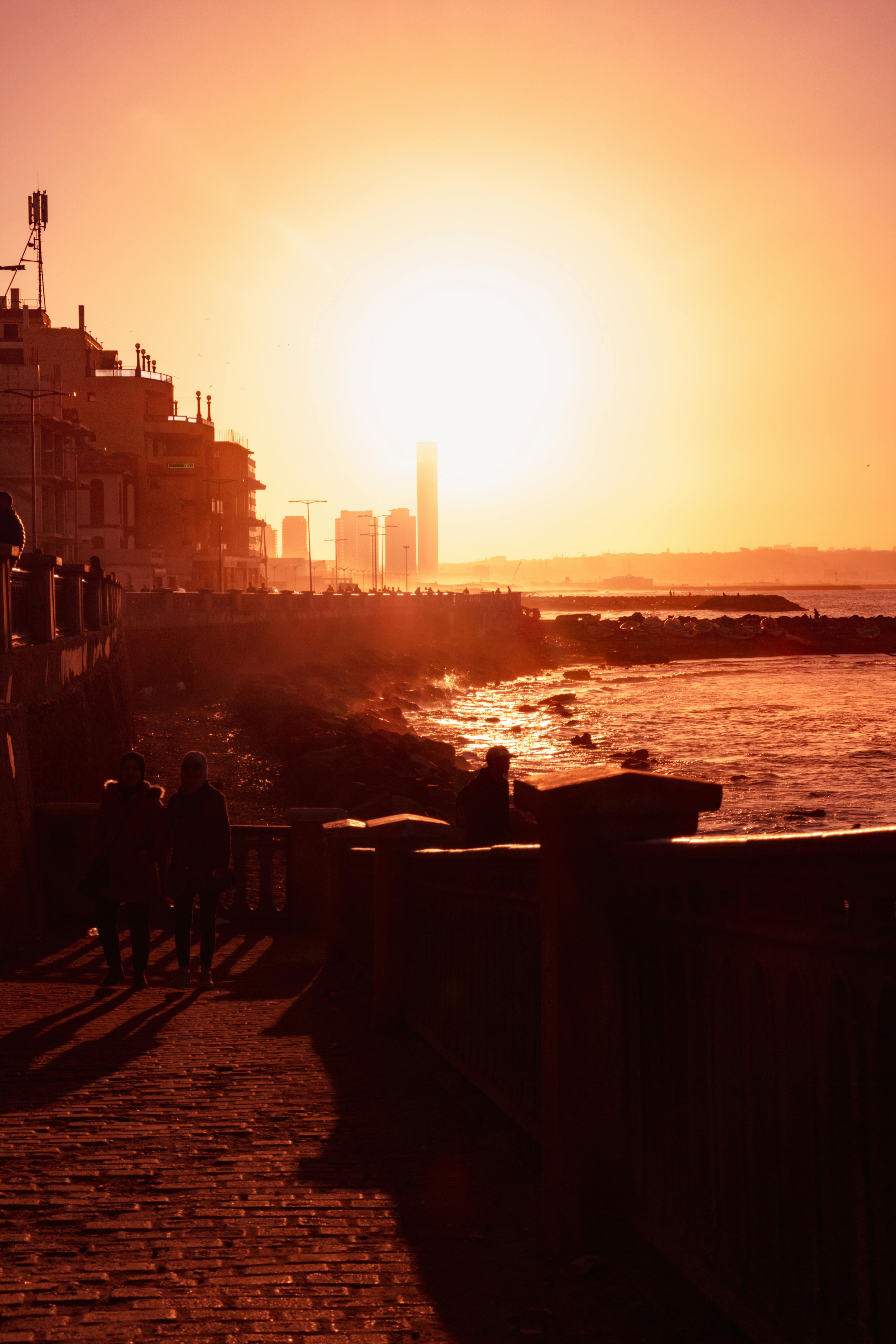 sharp sunset view of the mediterranean and great mosque of Algeria ...