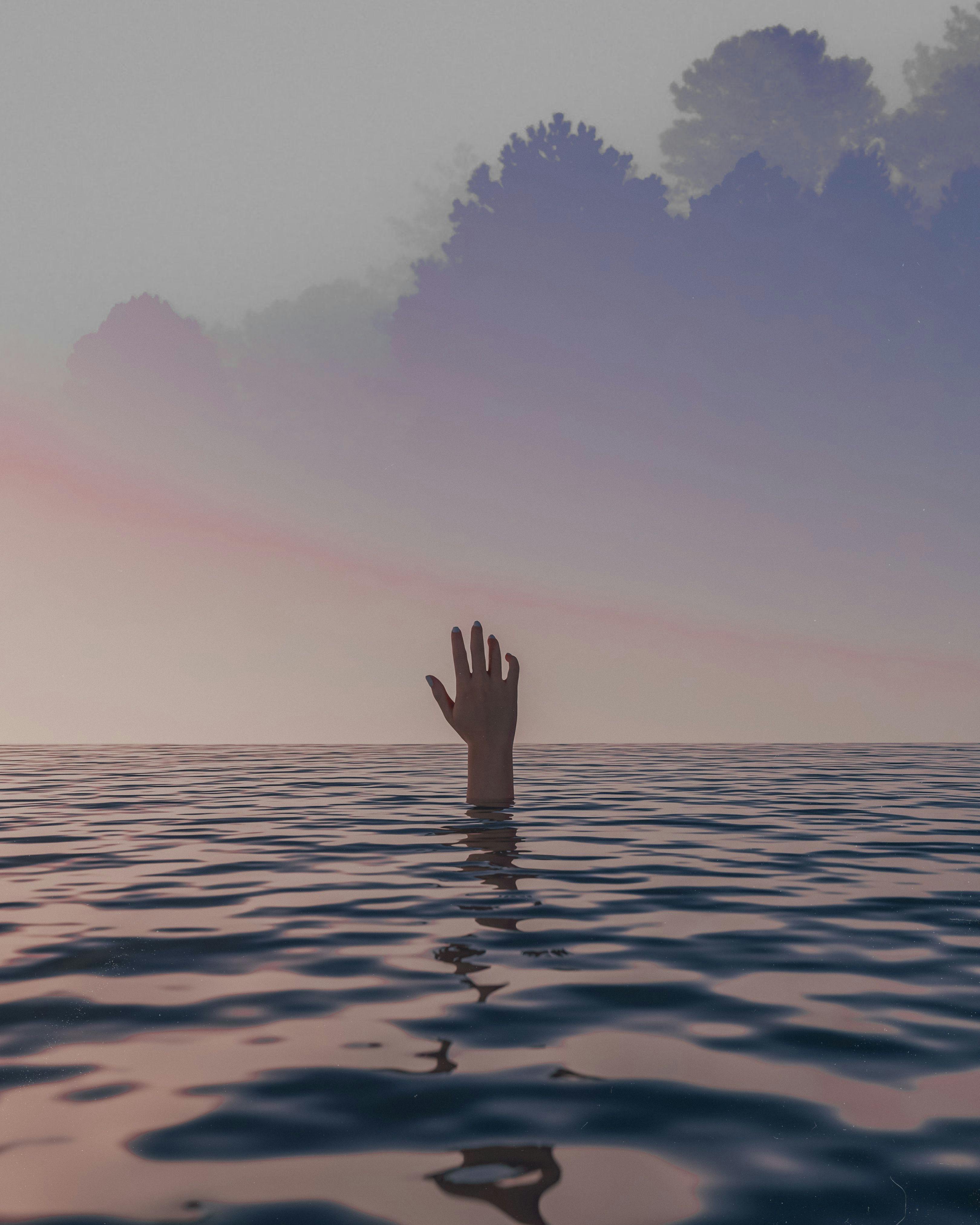 Person Drowning in Water · Free Stock Photo