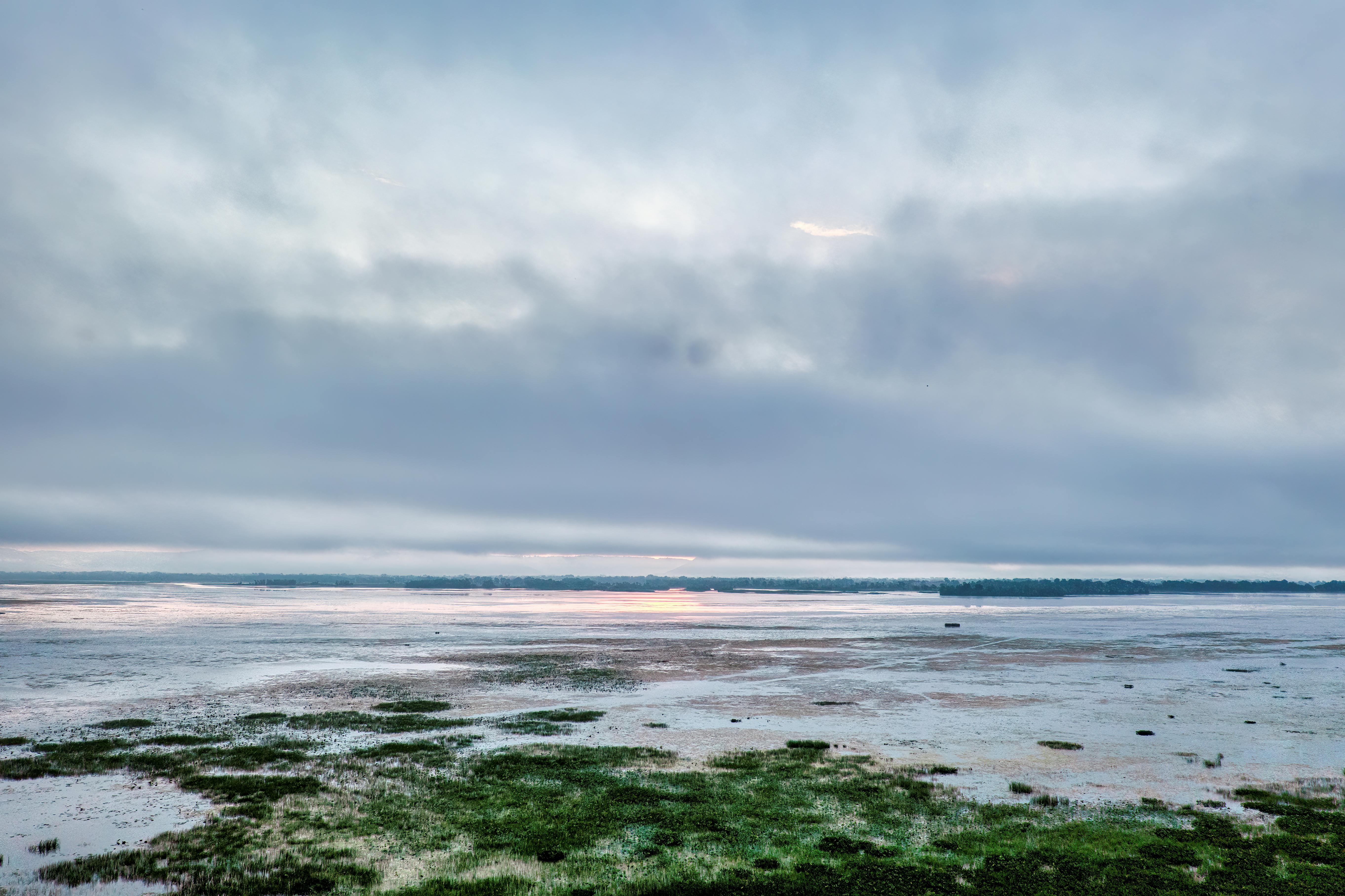 Ocean View Under Gray Sky · Free Stock Photo