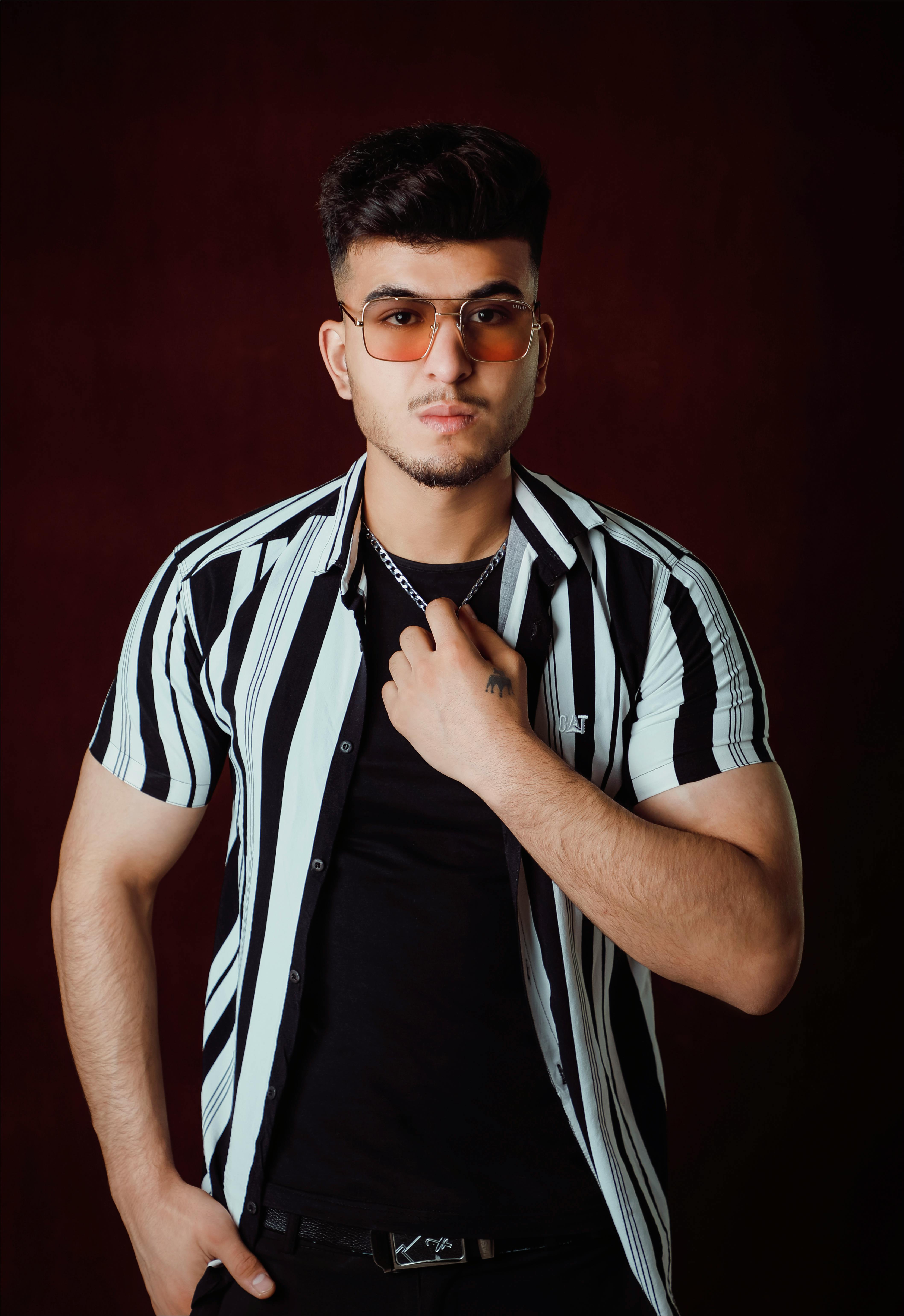 Men Wearing a Checked Suit and Sunglasses Posing by Garage Metal ...