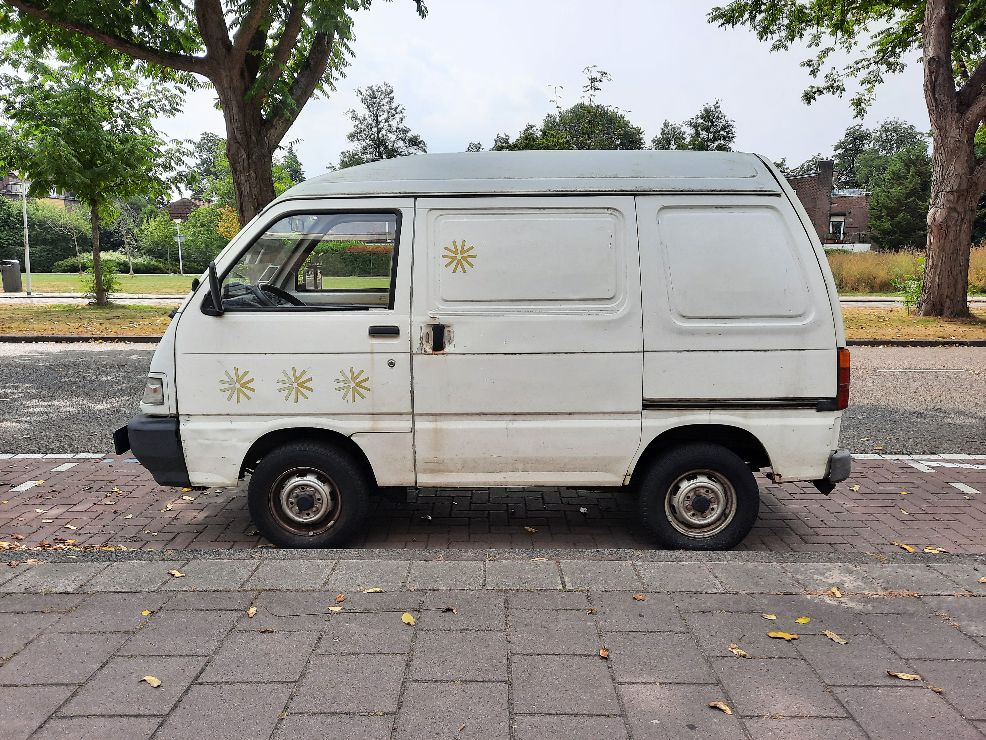 White Van on the Road · Free Stock Photo