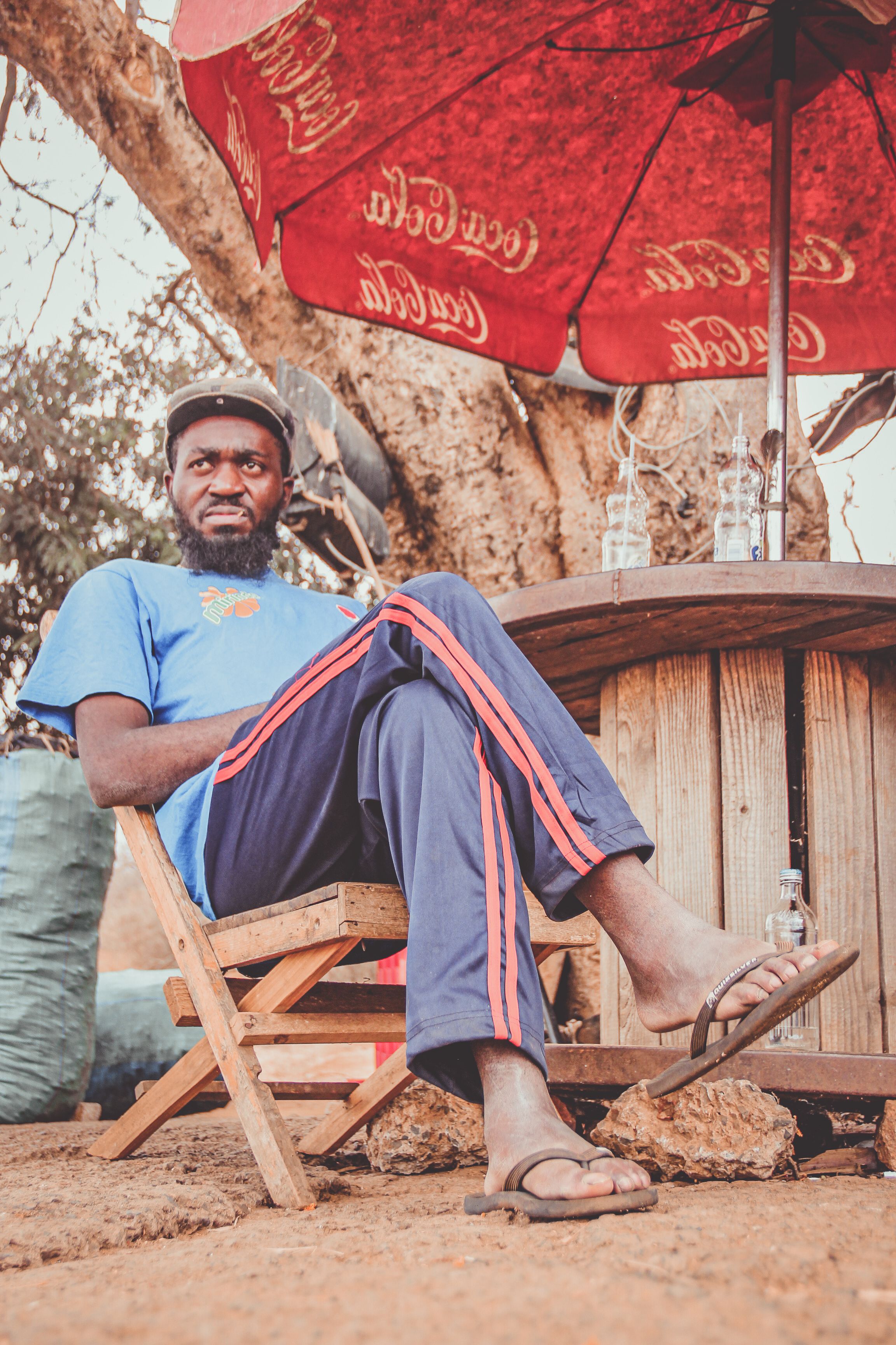 Man in Green Jacket Sitting on a Chair · Free Stock Photo
