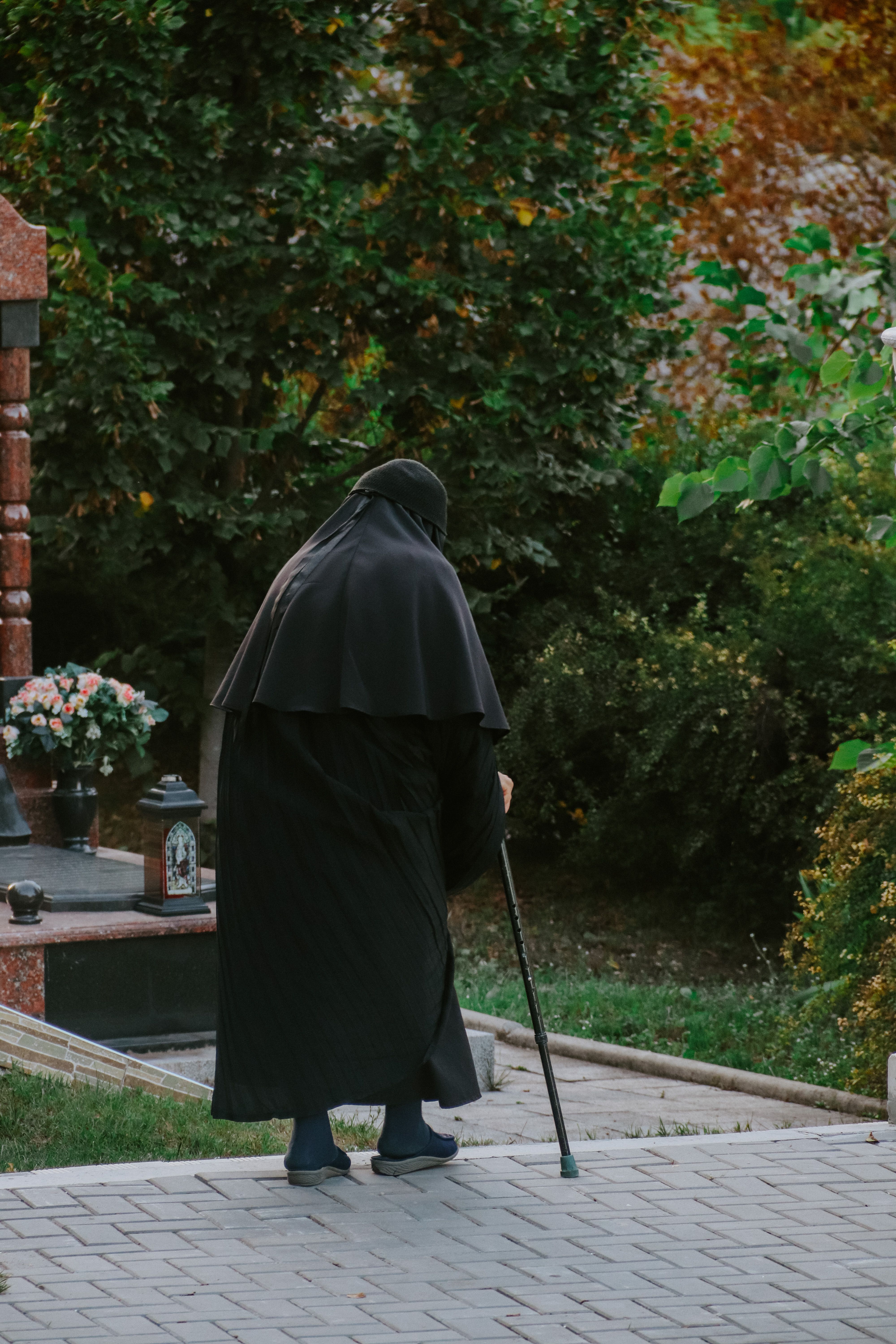 Woman in Black Dress and Vail Walking · Free Stock Photo