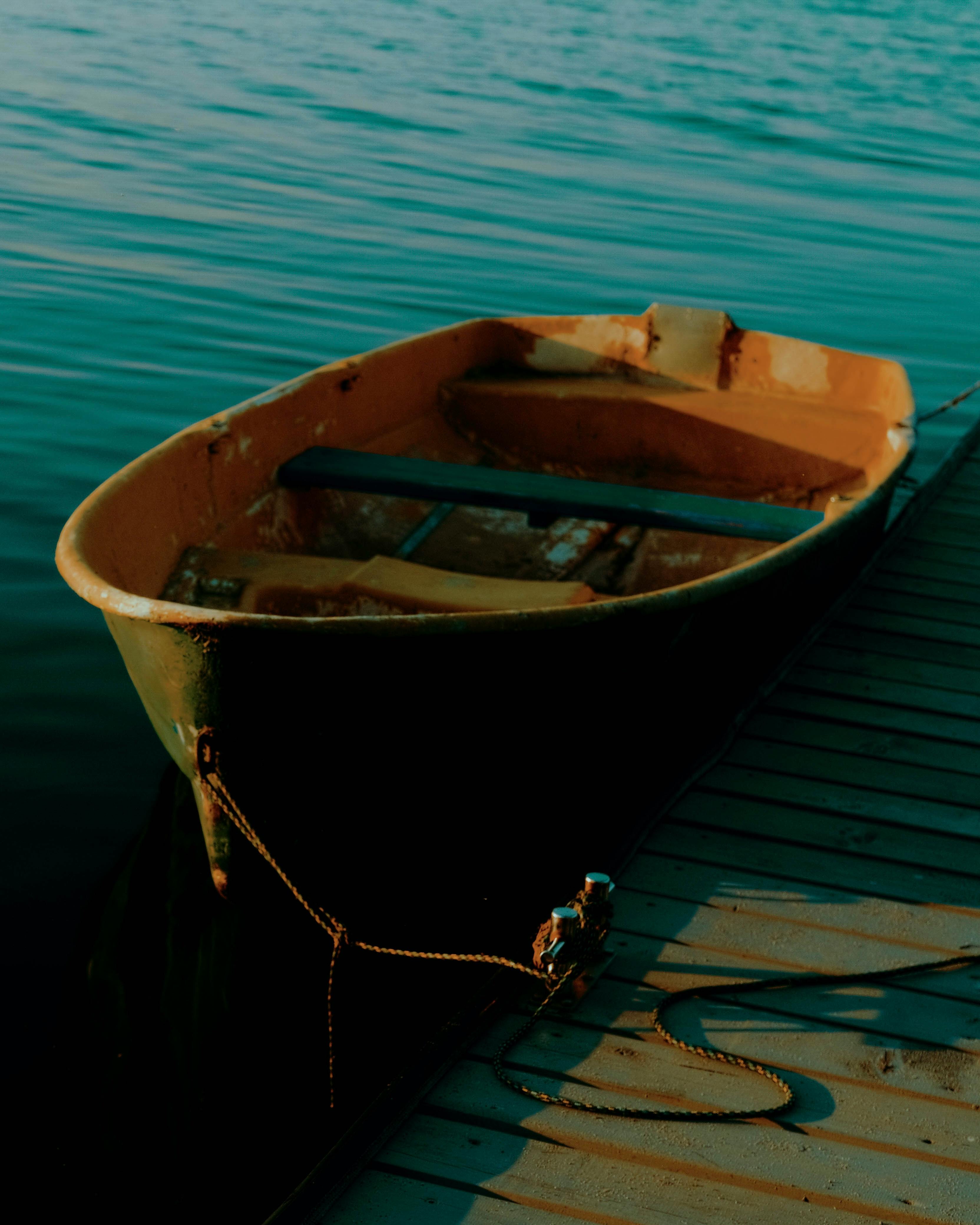 Wooden Boat on Water · Free Stock Photo